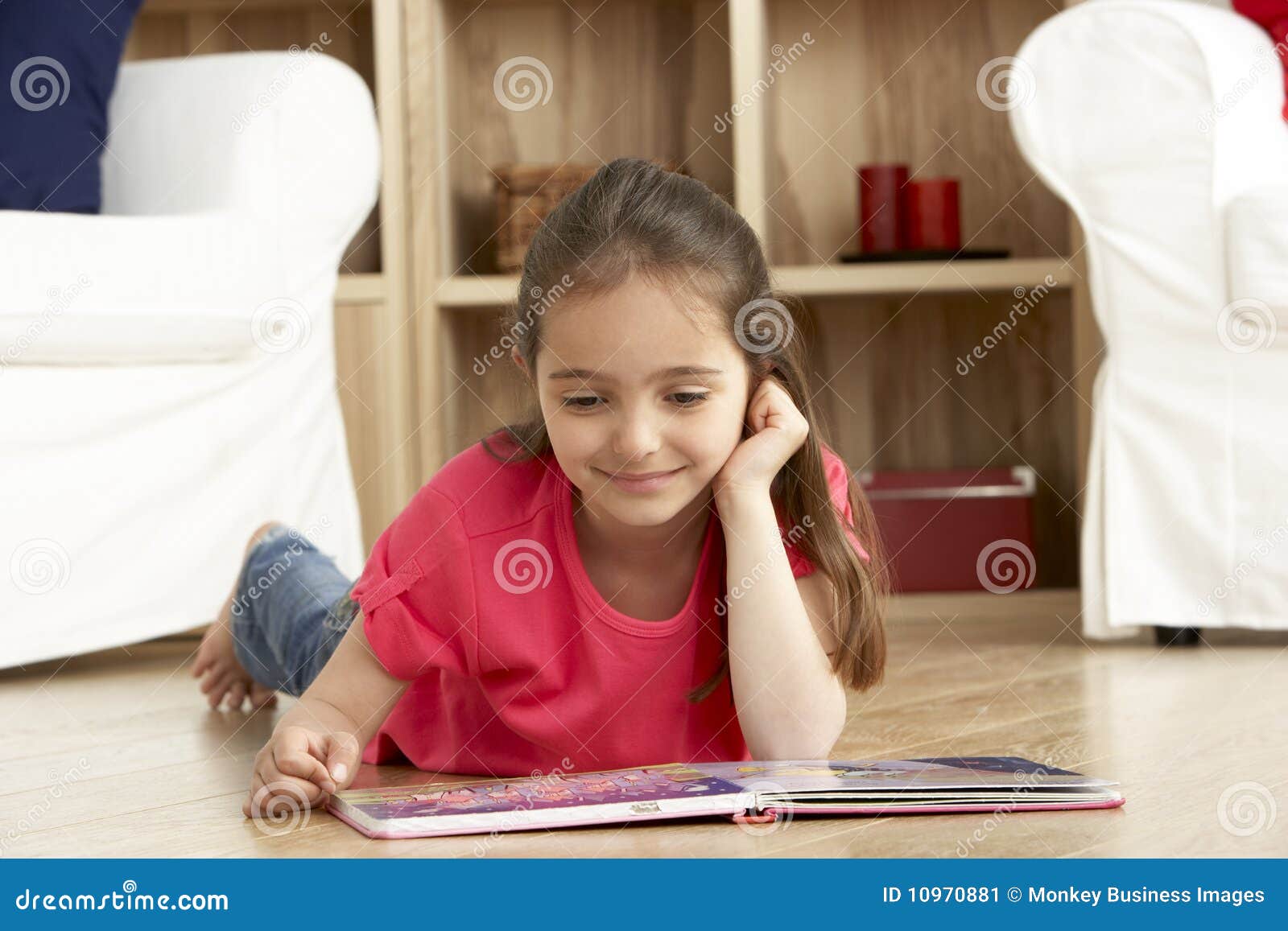 Young Girl Reading Book at Home Stock Image - Image of sitting, girl ...