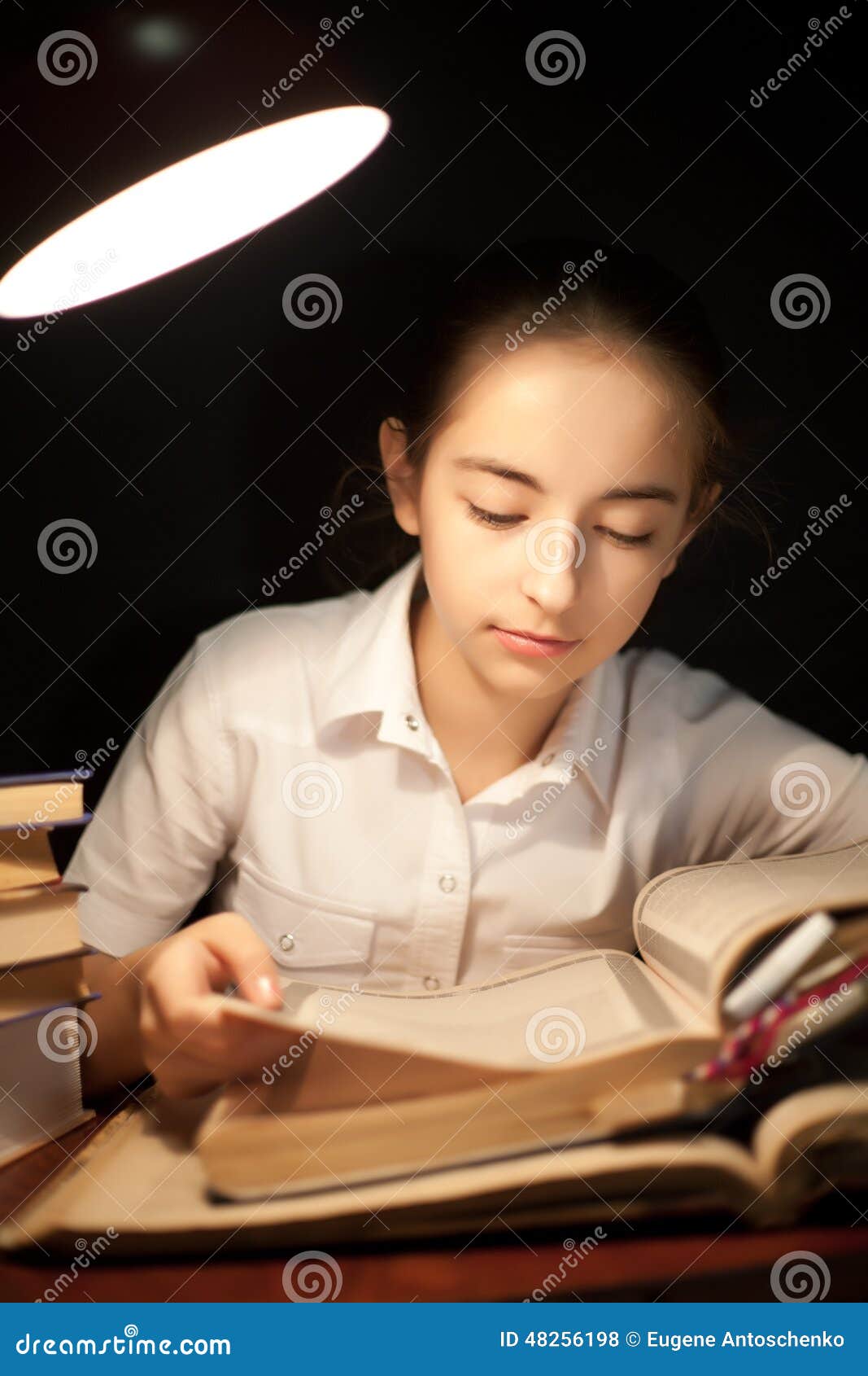 Young Girl Reading Book at Night Dark at Library Stock Photo - Image of ...
