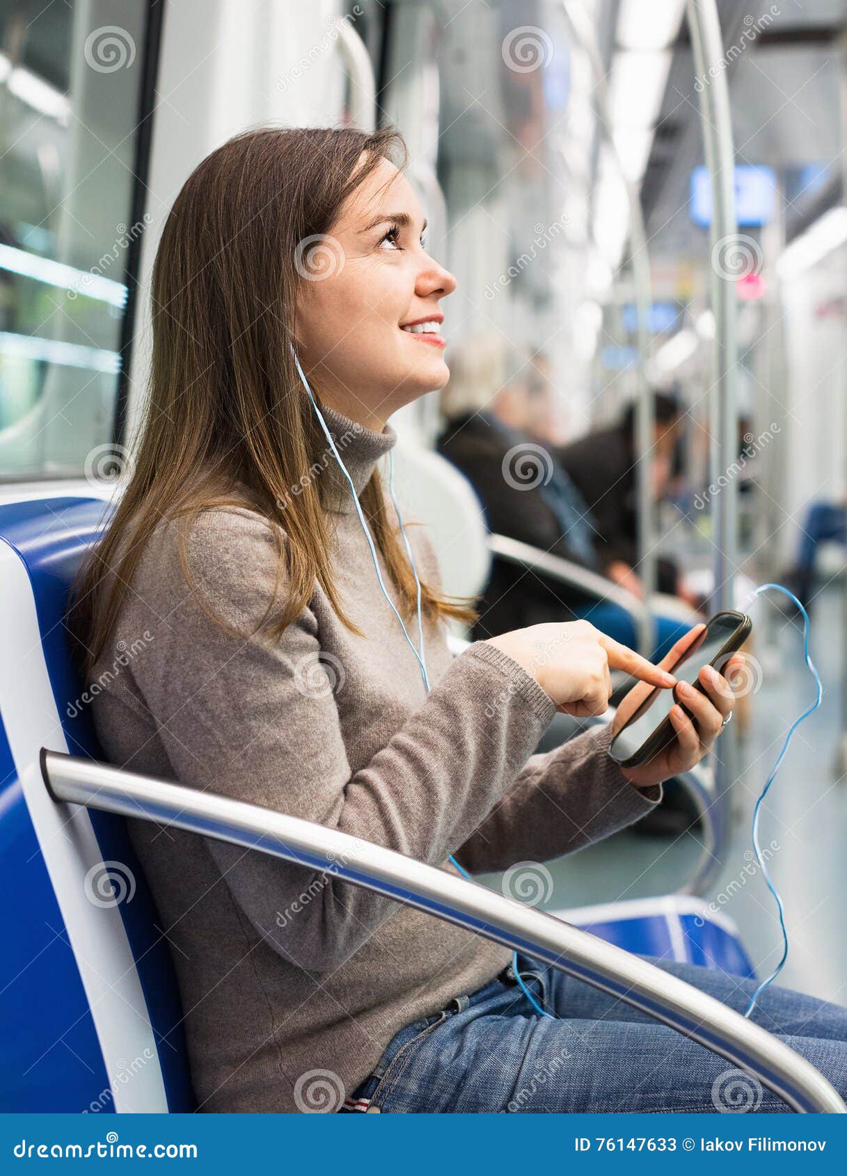Young Girl Reading from Mobile Phone Screen Stock Image - Image of ...