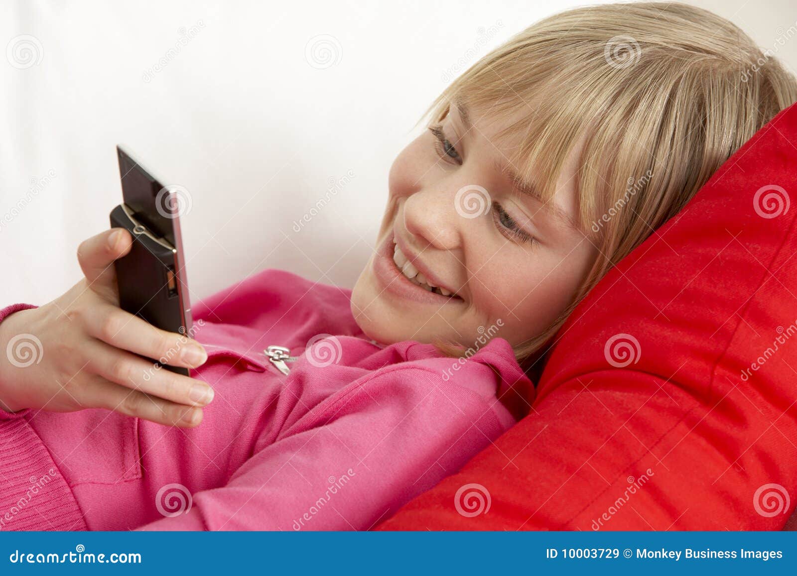 Young Girl Reading Text Message Stock Image - Image of caucasian ...