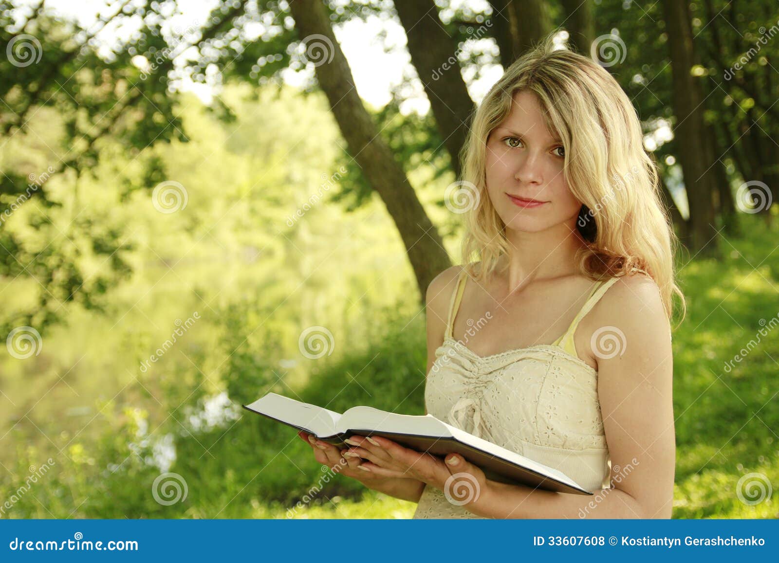 Young girl reads the Bible stock photo. Image of girls - 33607608