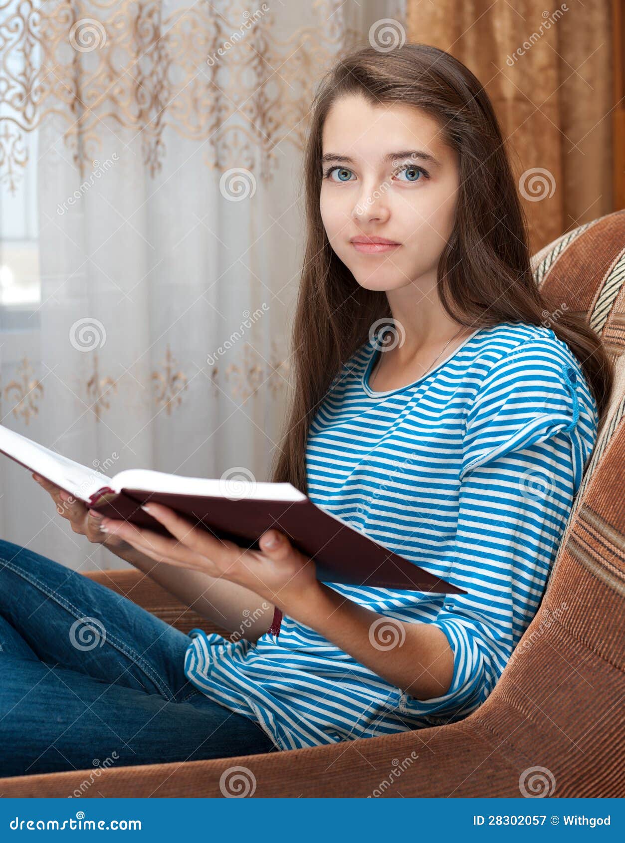 Young girl reads book stock image. Image of girl, look - 28302057