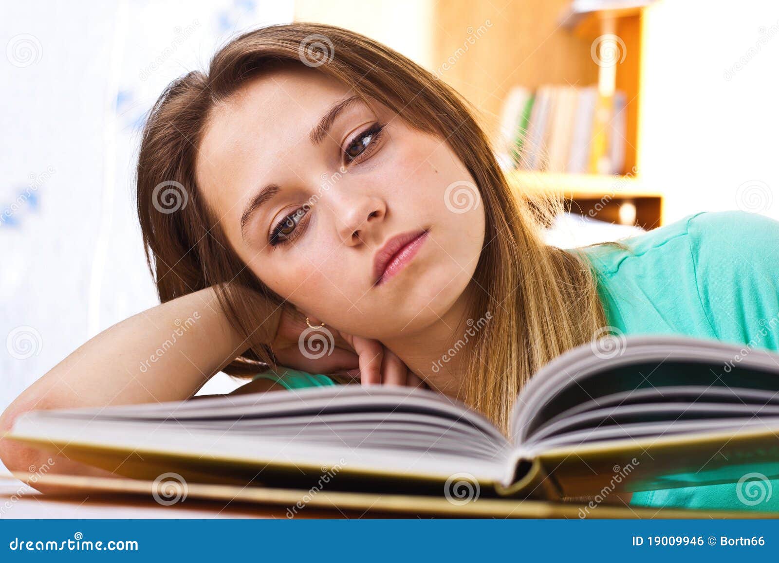 The Young Girl Reads the Textbook Stock Photo - Image of expressing ...