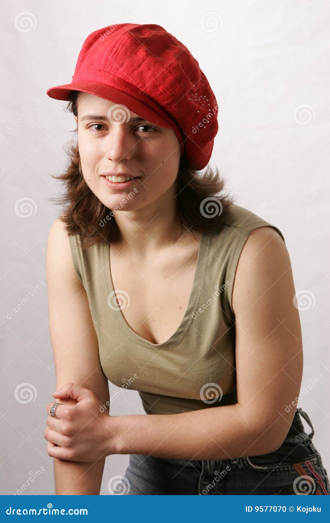 Young girl in red cap stock photo. Image of beauty, woman - 9577070