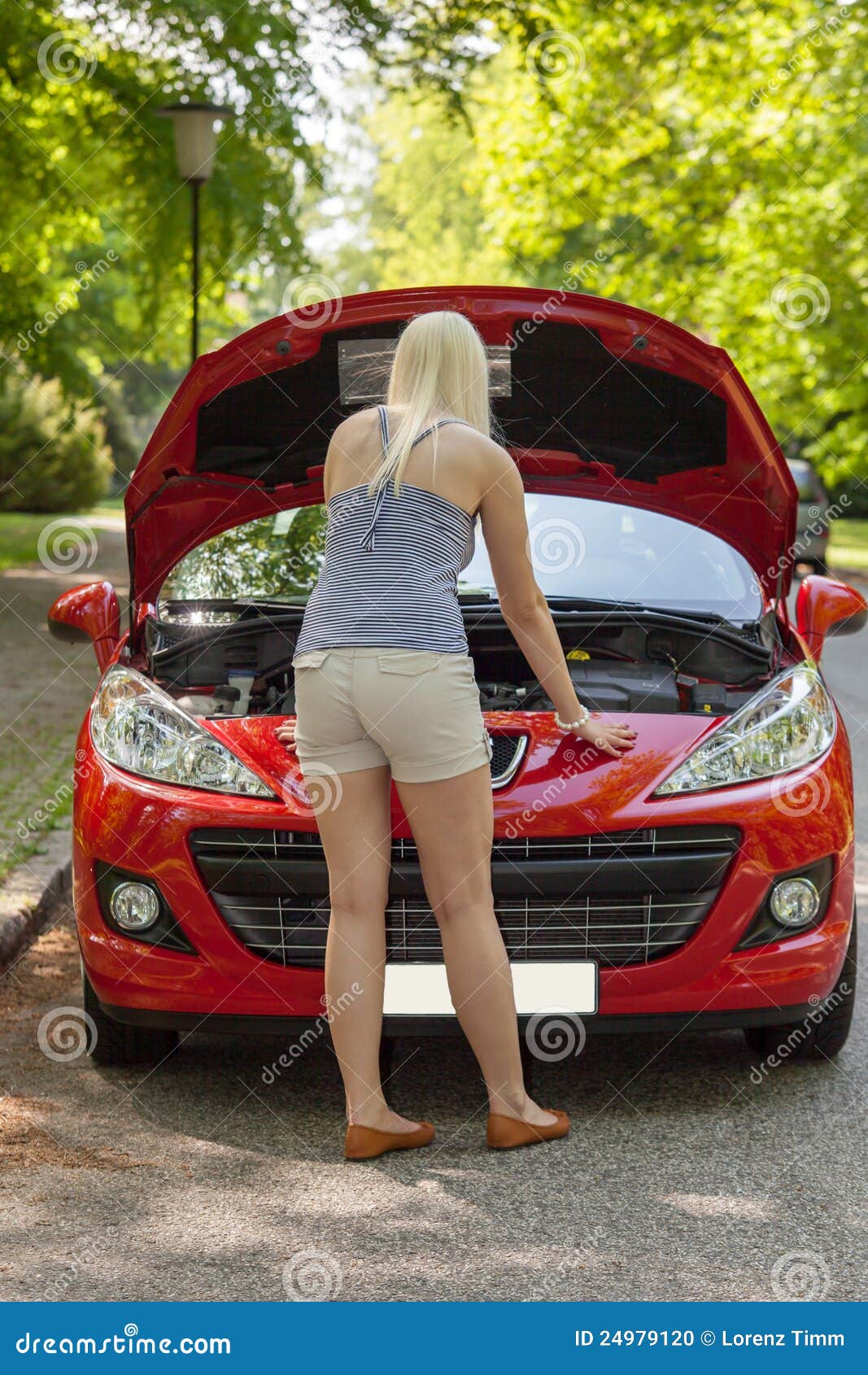 A Young Girl with a Red Car Stock Photo - Image of girl, young: 24979120
