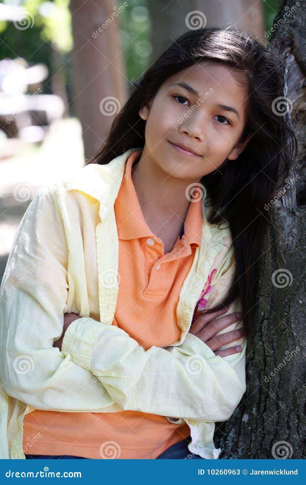 Young Girl Relaxing Against Tree Stock Image - Image of smiling, thai ...