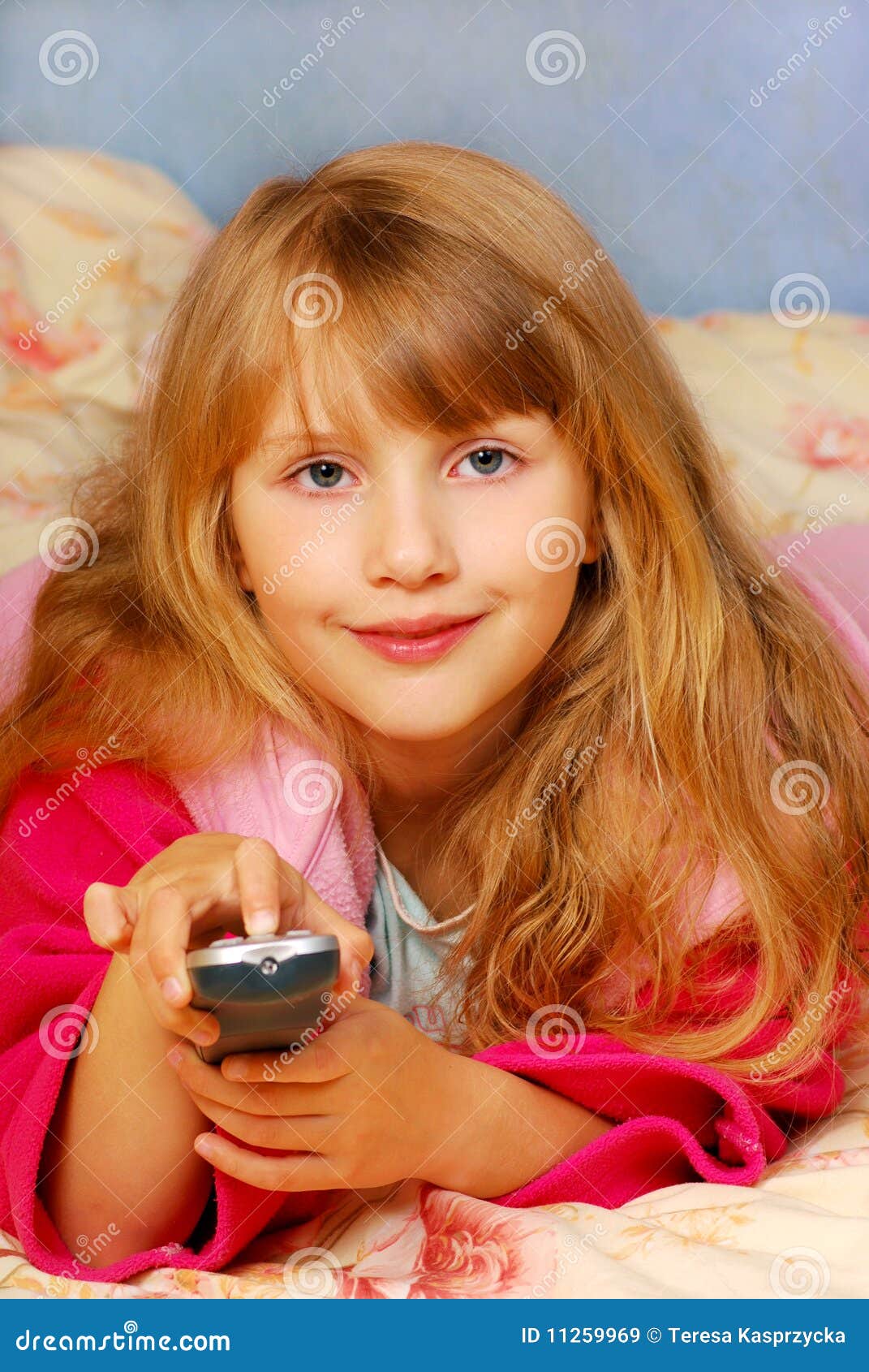 Young Girl with Remote Control in Hand Stock Image - Image of film ...