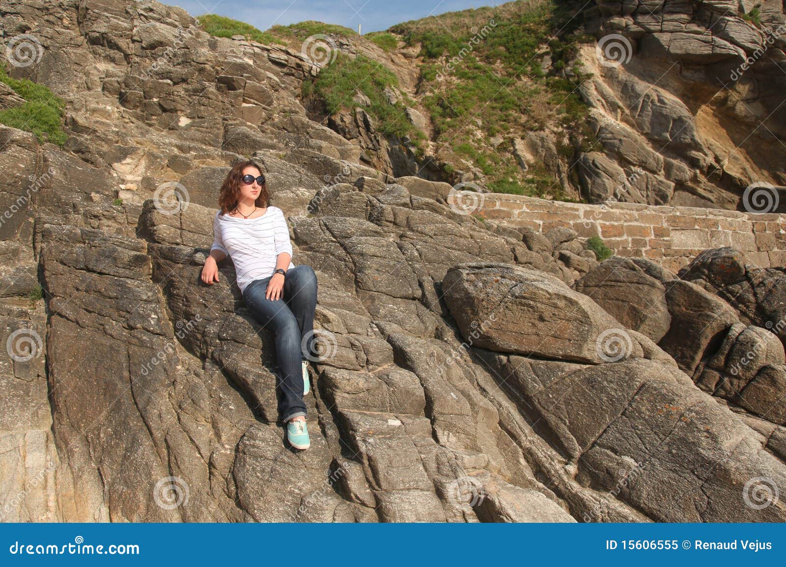 Young girl on the rocks stock image. Image of relaxation - 15606555