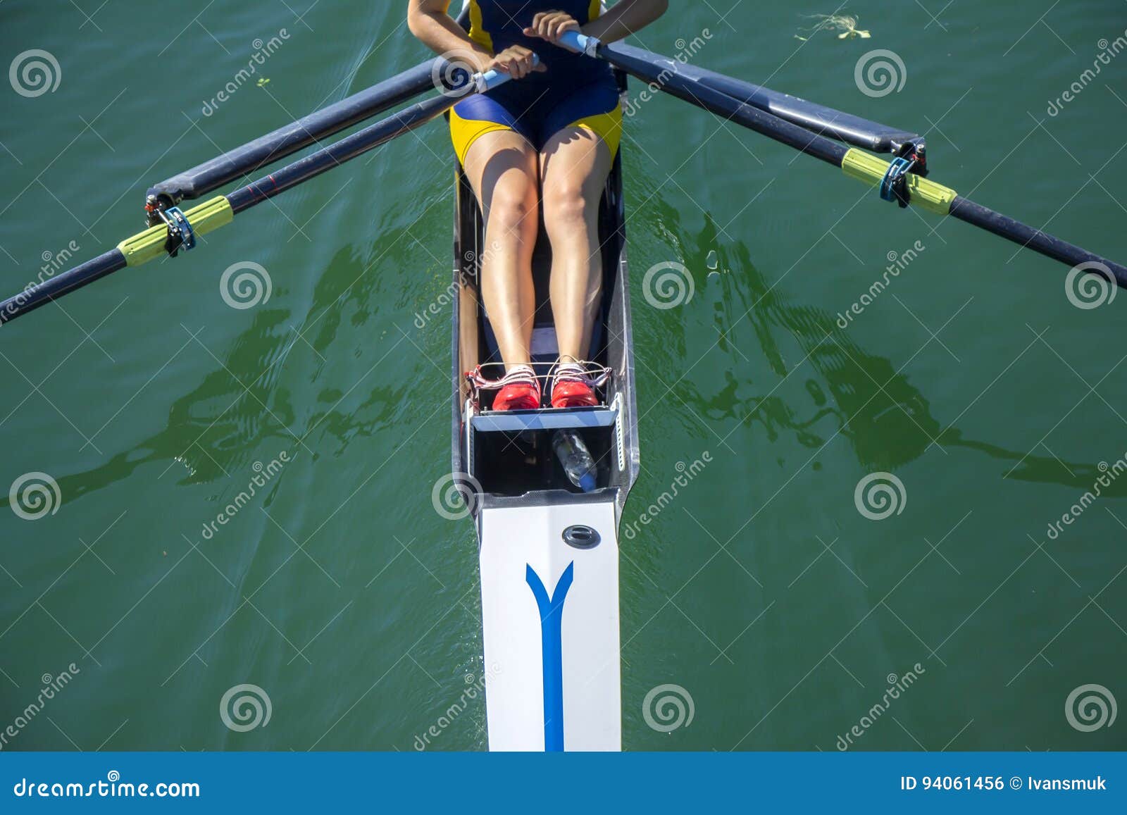 A Young Girl Rowing in Boat Stock Photo - Image of outdoors, fitness ...
