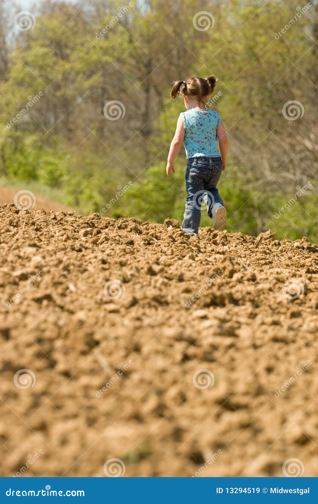 Young Girl Running on a Plowed Field Stock Image - Image of adventurous ...