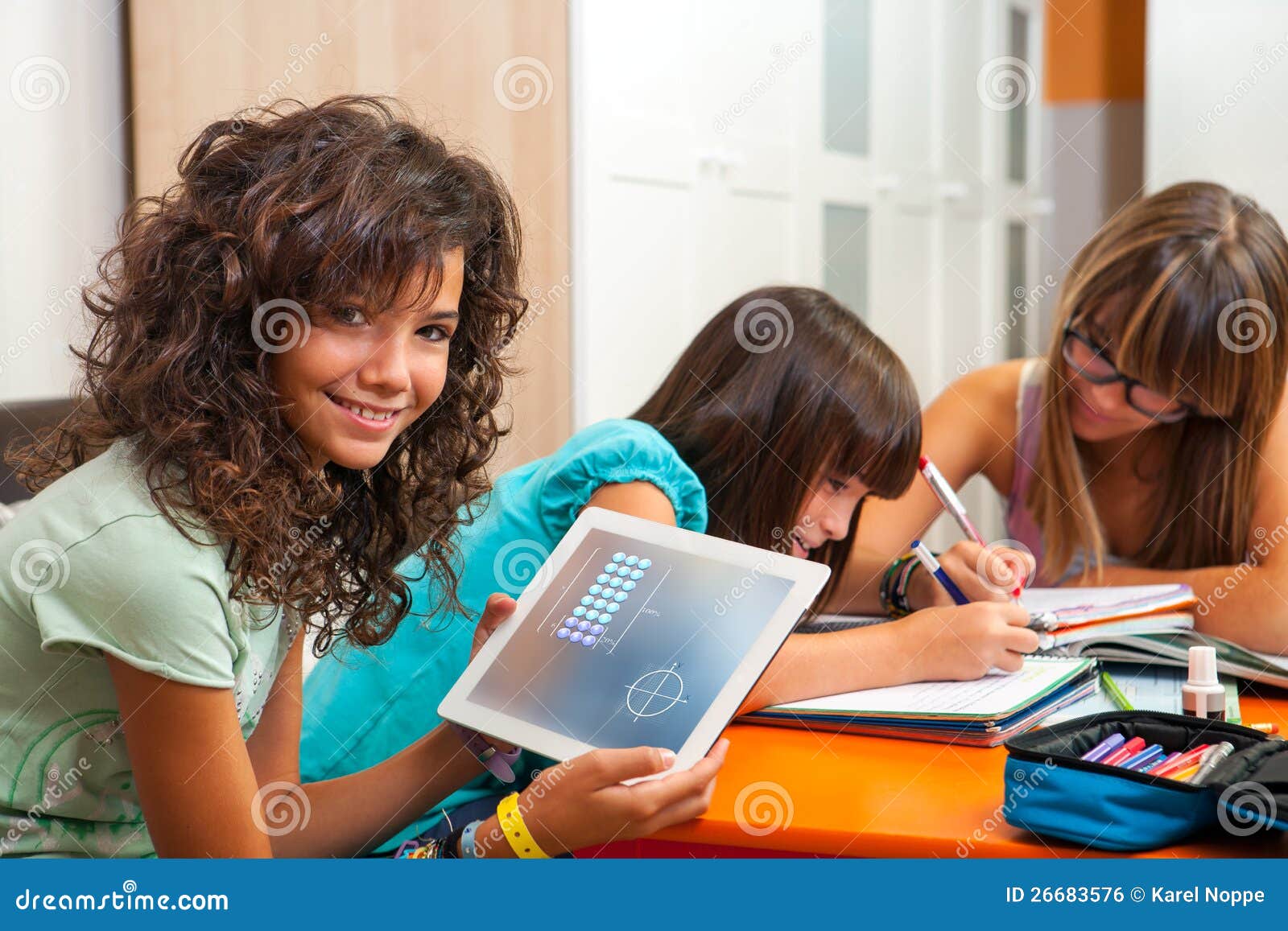 Young Girl Showing Homework on Tablet Indoors. Stock Photo - Image of ...