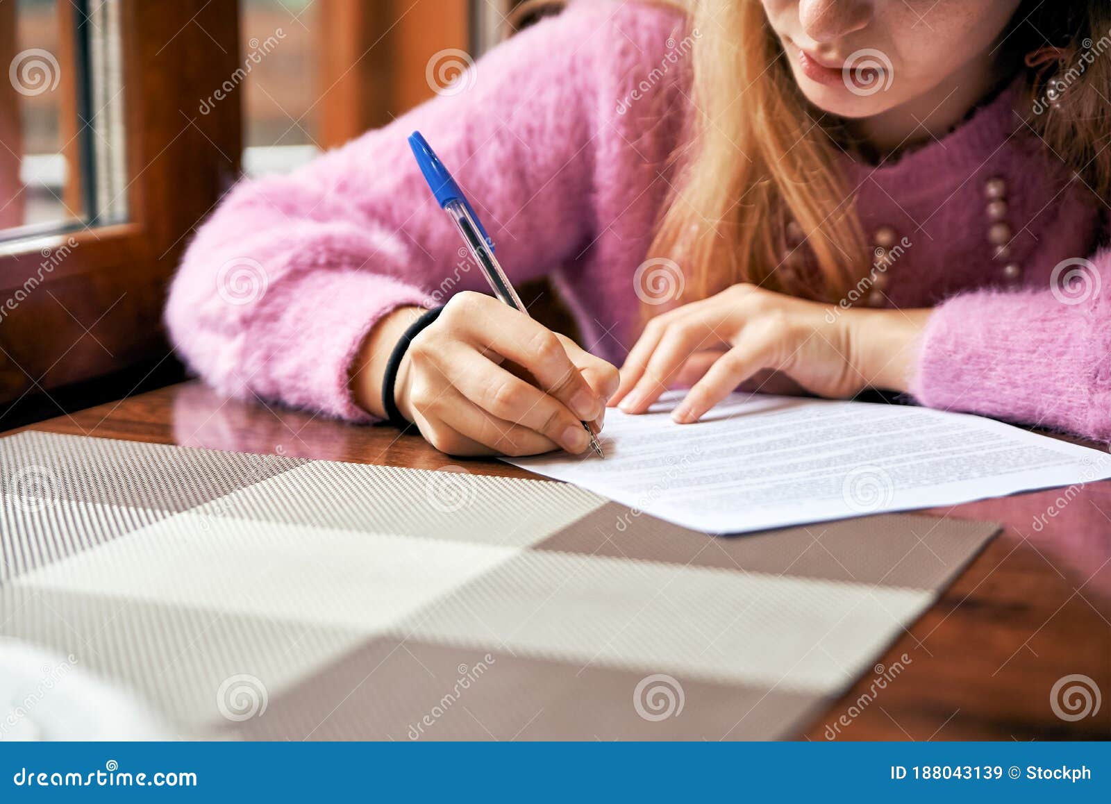 Young Girl Signs a Document. Student Learns To Write an Abstract Stock ...