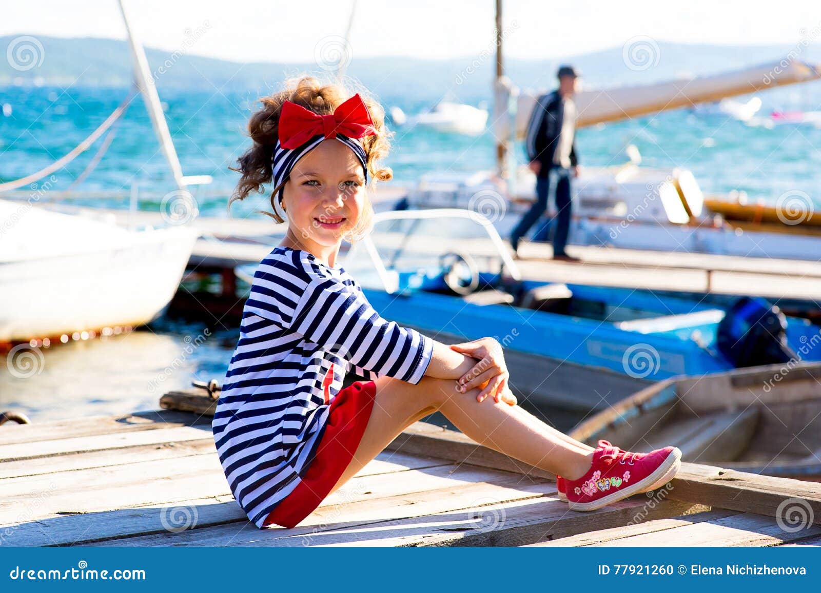 Young Girl Sitting on the Dock Stock Photo - Image of children, pose ...