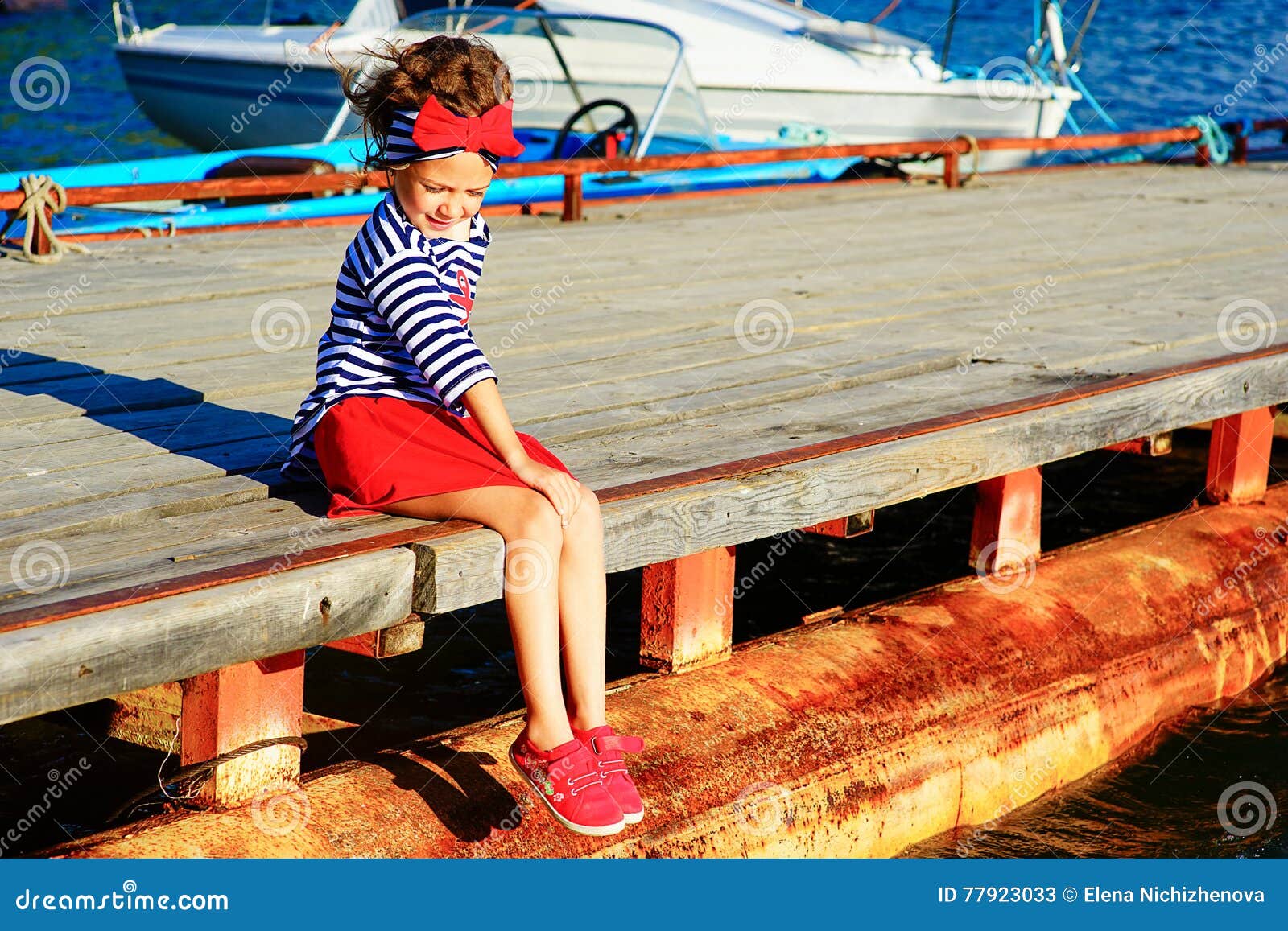 Young Girl Sitting on the Dock Stock Image - Image of friends, pier ...