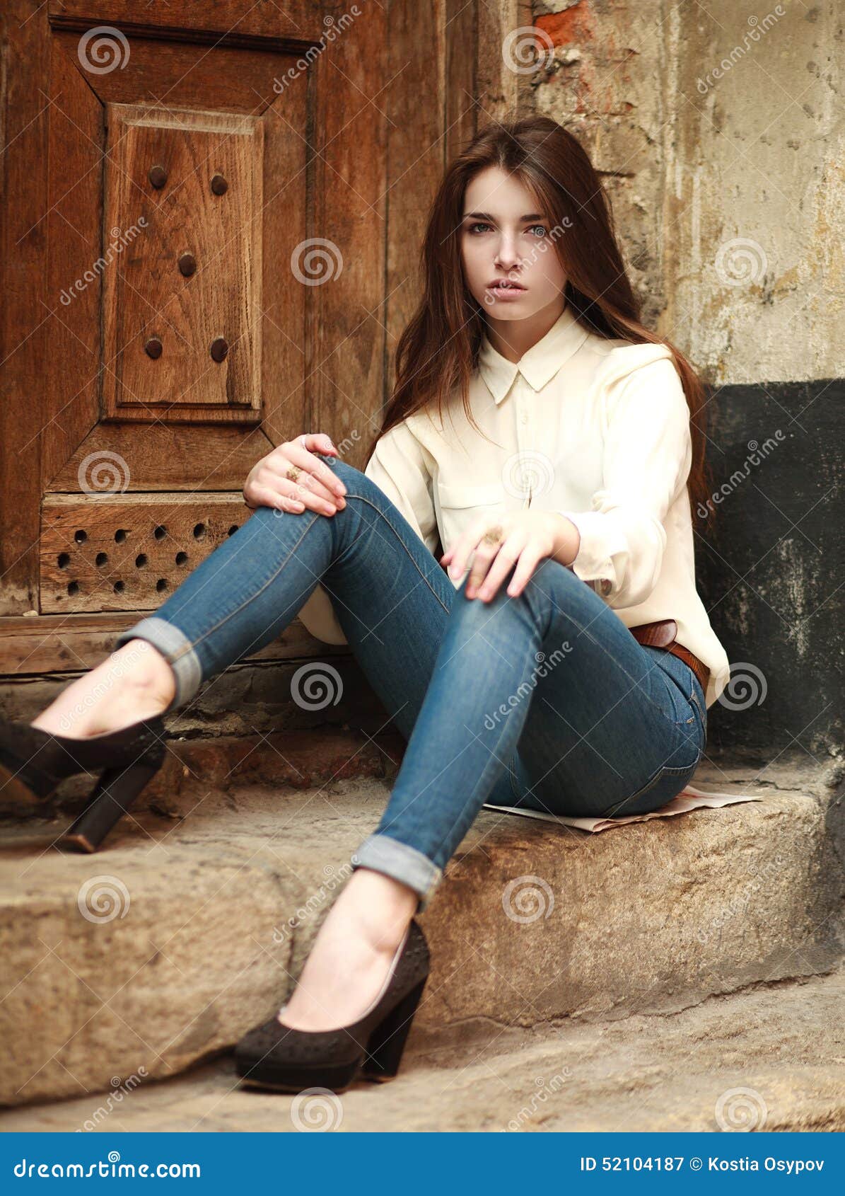 Young Girl Sitting Outdoors Sad, on Background an Old House Stock Image ...