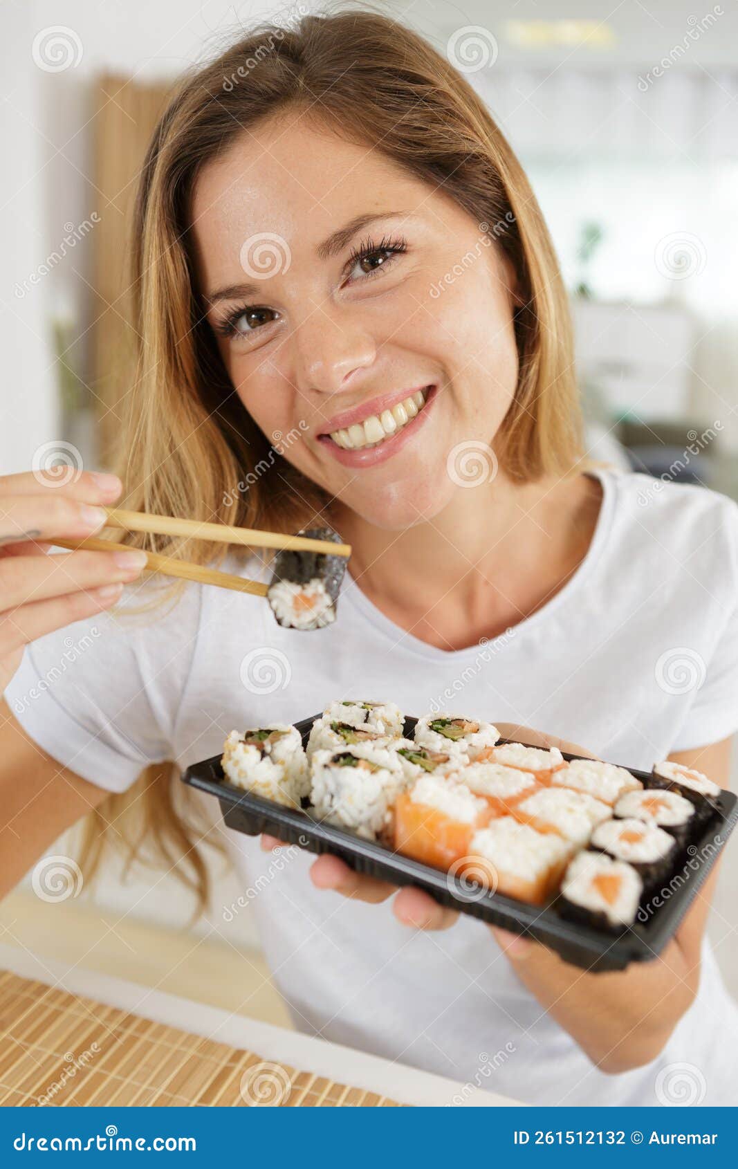 Young Girl Sitting at Table with Sushi Smiling Stock Photo - Image of ...