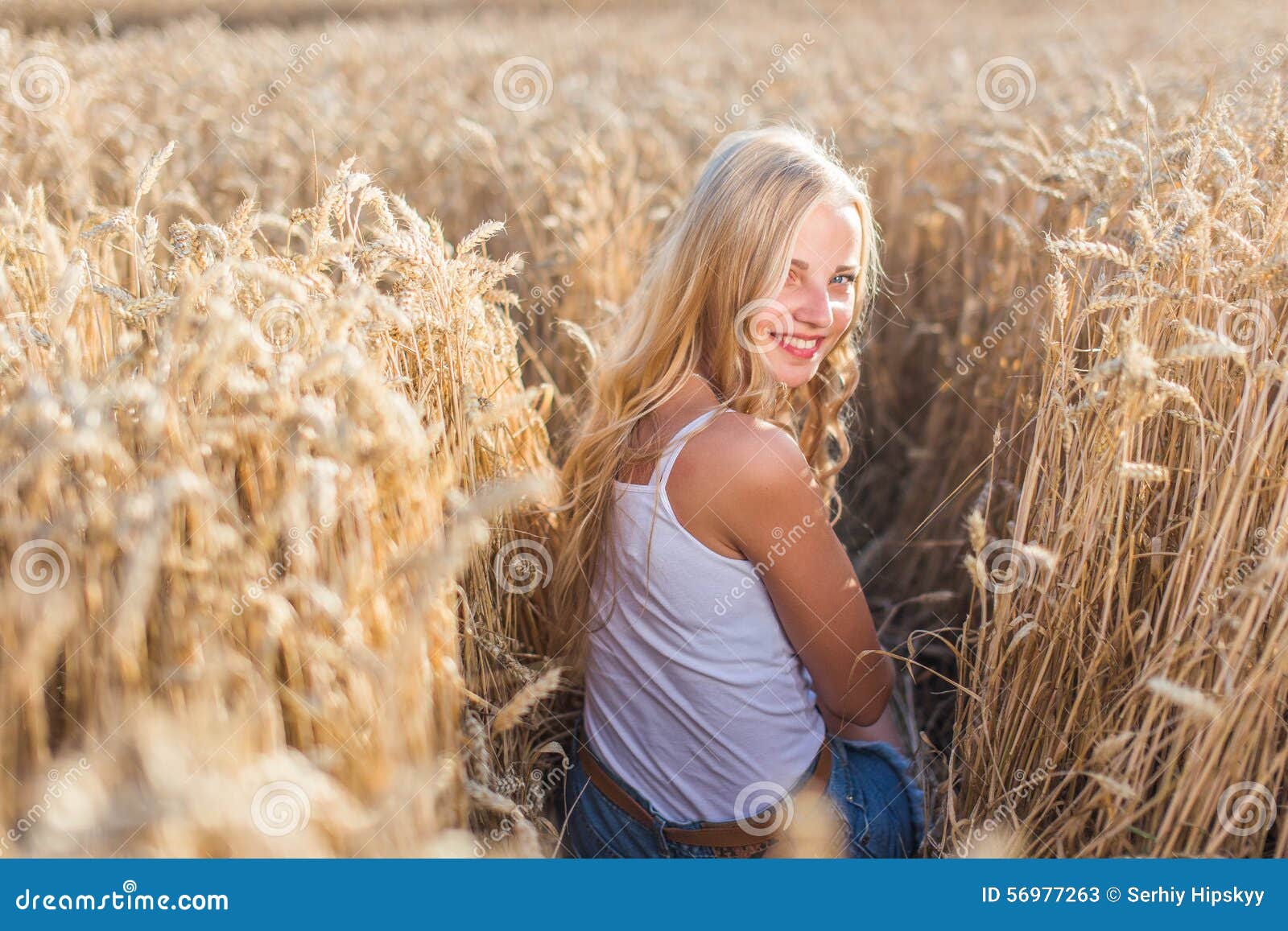 Young Girl is Smiling in the Field. Stock Image - Image of caucasian ...