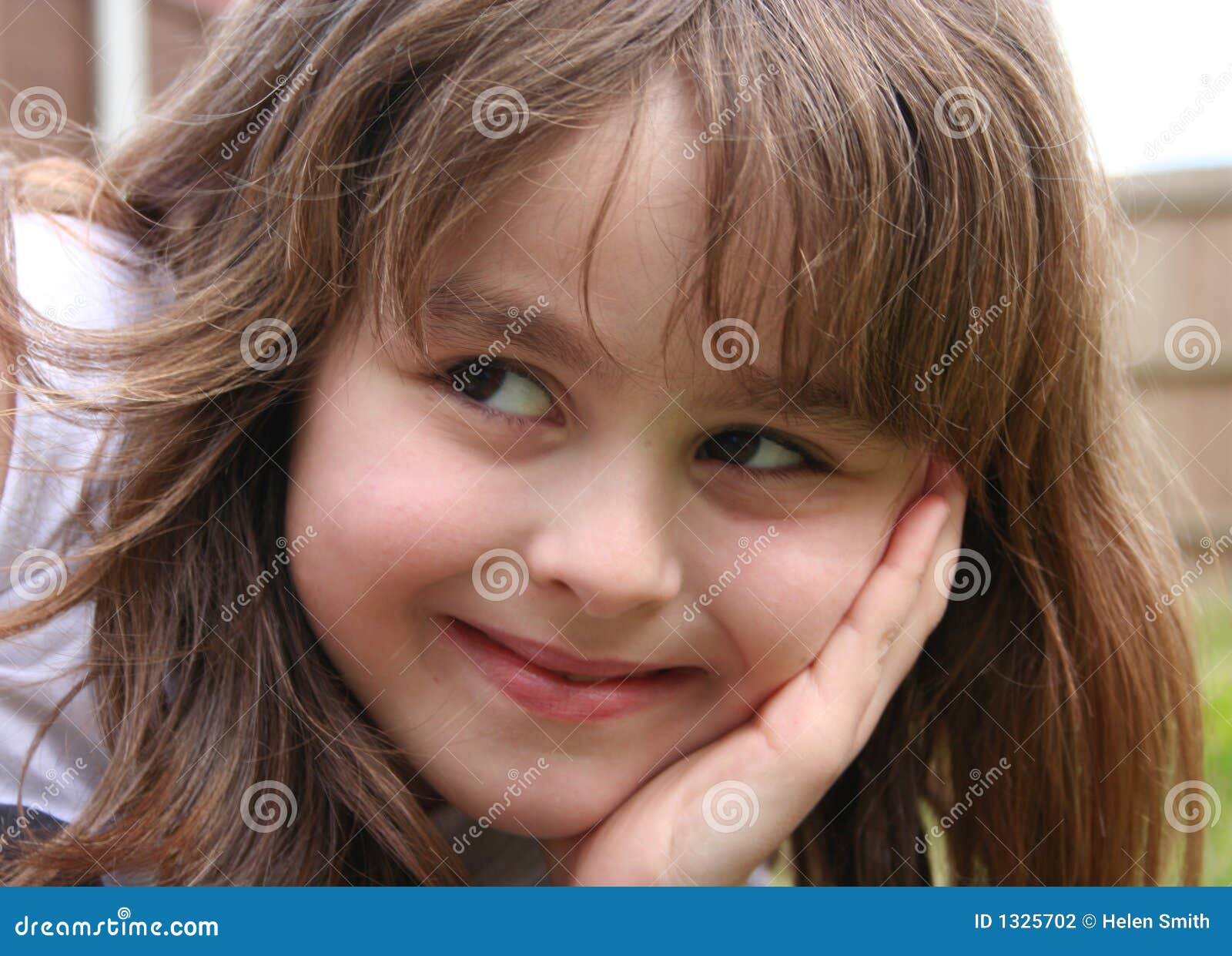 Young Girl Smiling Sideways Stock Photo - Image of posing, young: 1325702