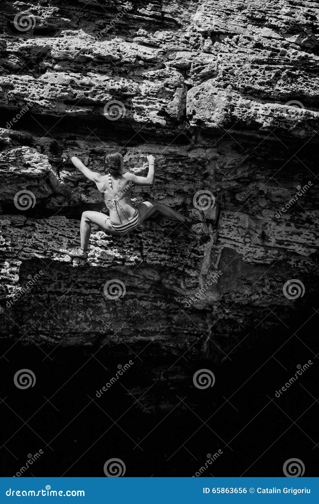 Young Girl Solo Climbing Above Water Stock Photo - Image of rock, cliff ...