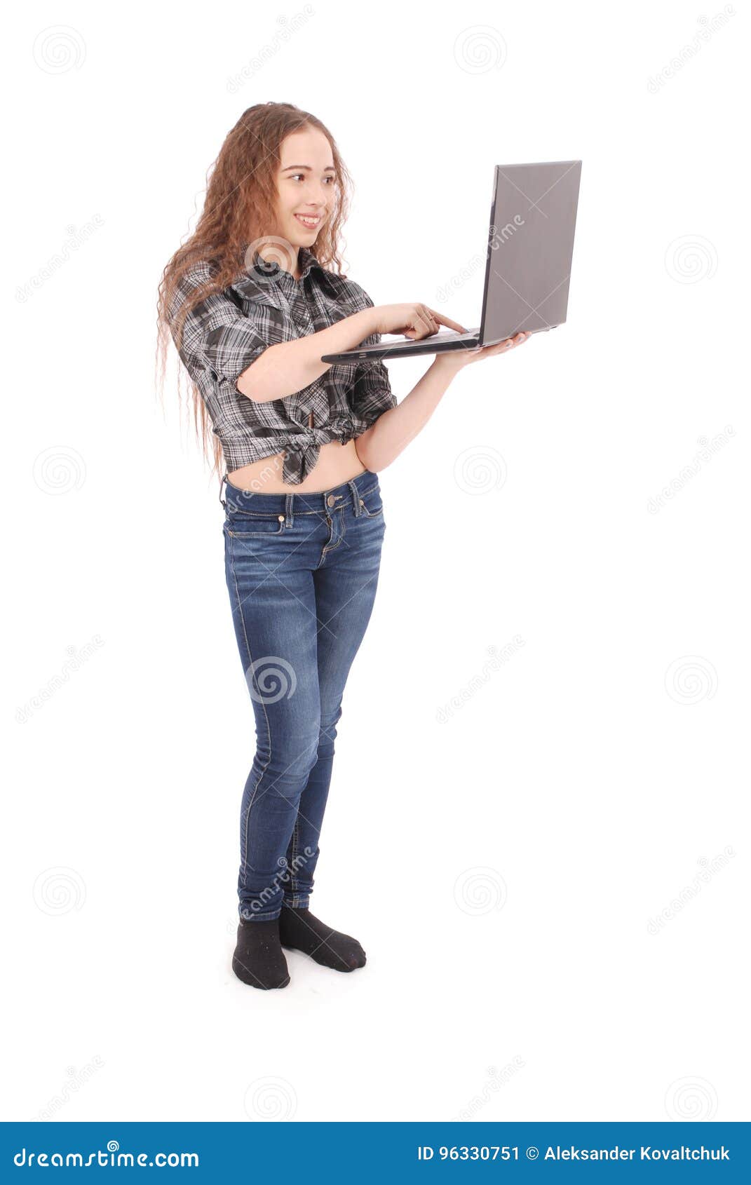 Young Girl Standing and Using a Laptop Stock Image - Image of people ...