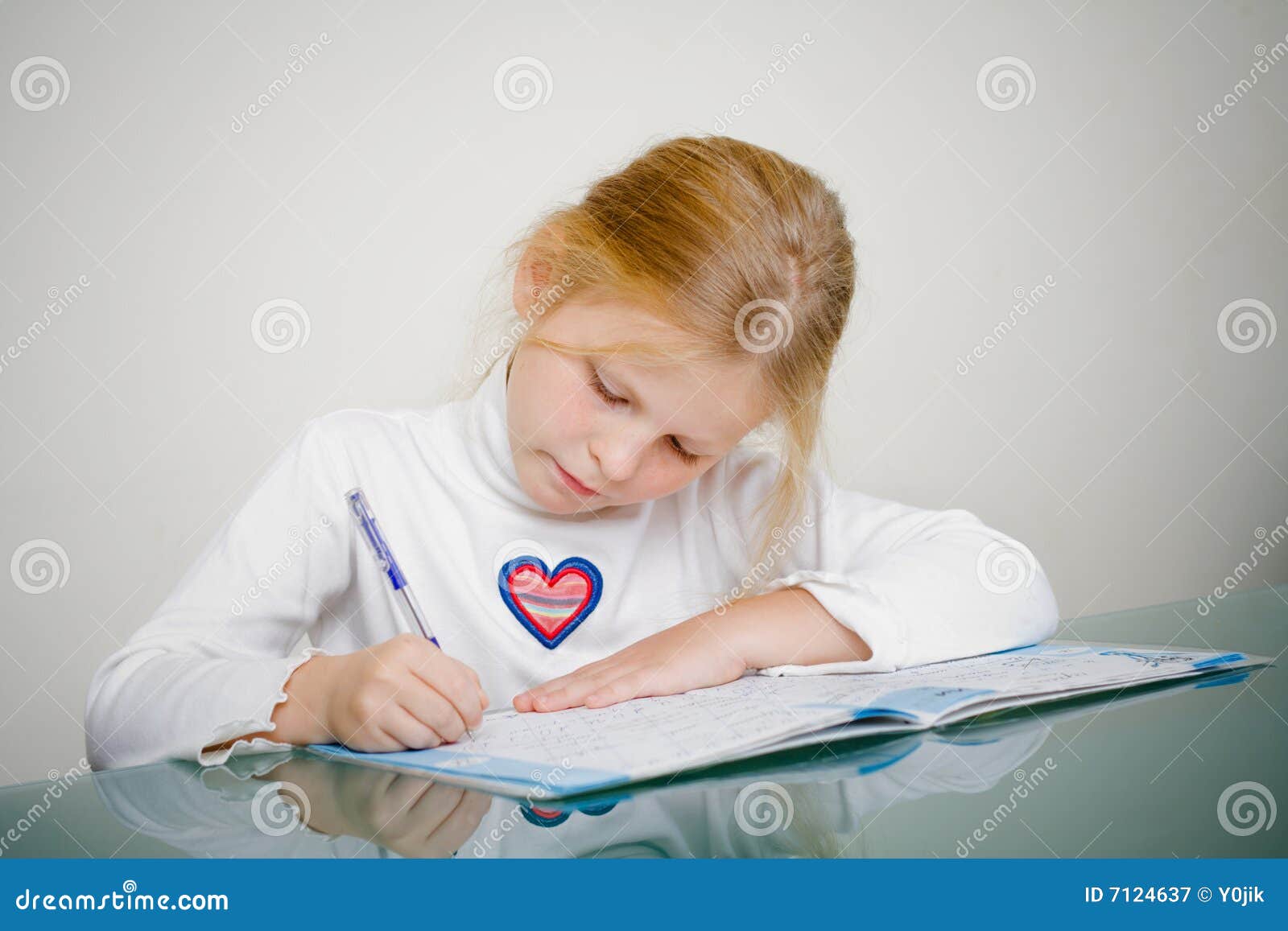 Young girl is studying stock image. Image of study, blond - 7124637