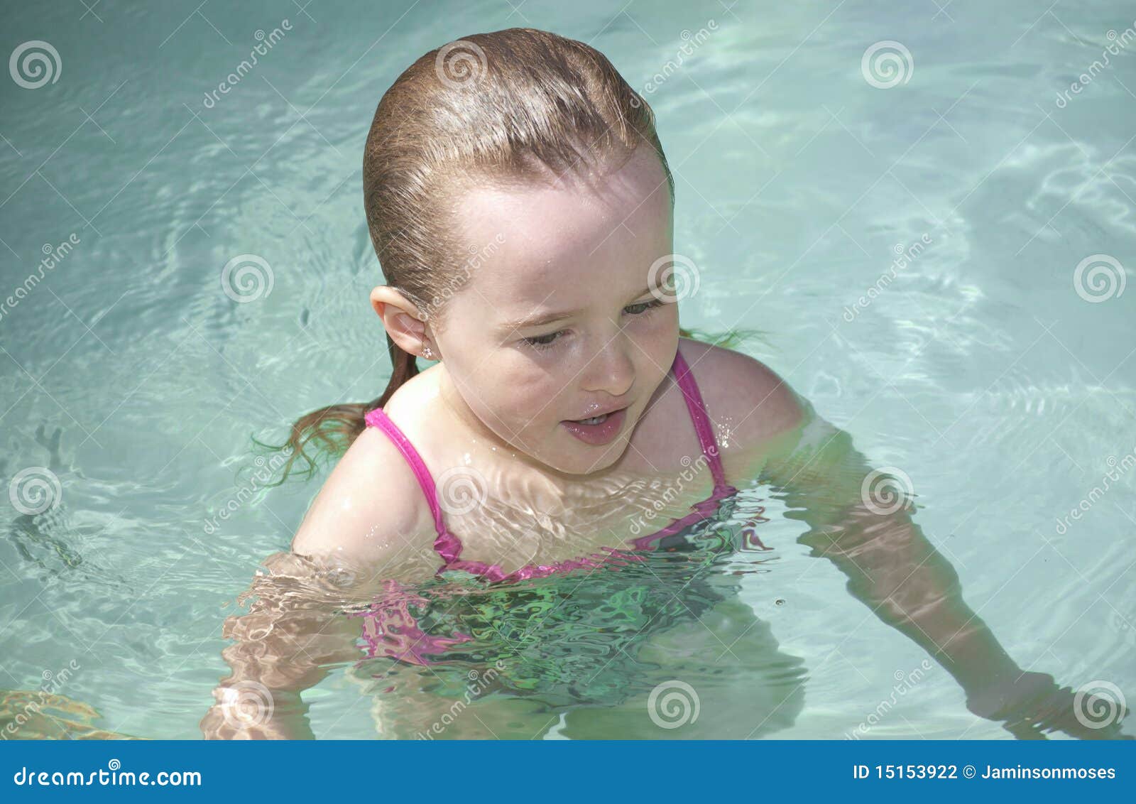 Young girl swimming stock photo. Image of expression - 15153922