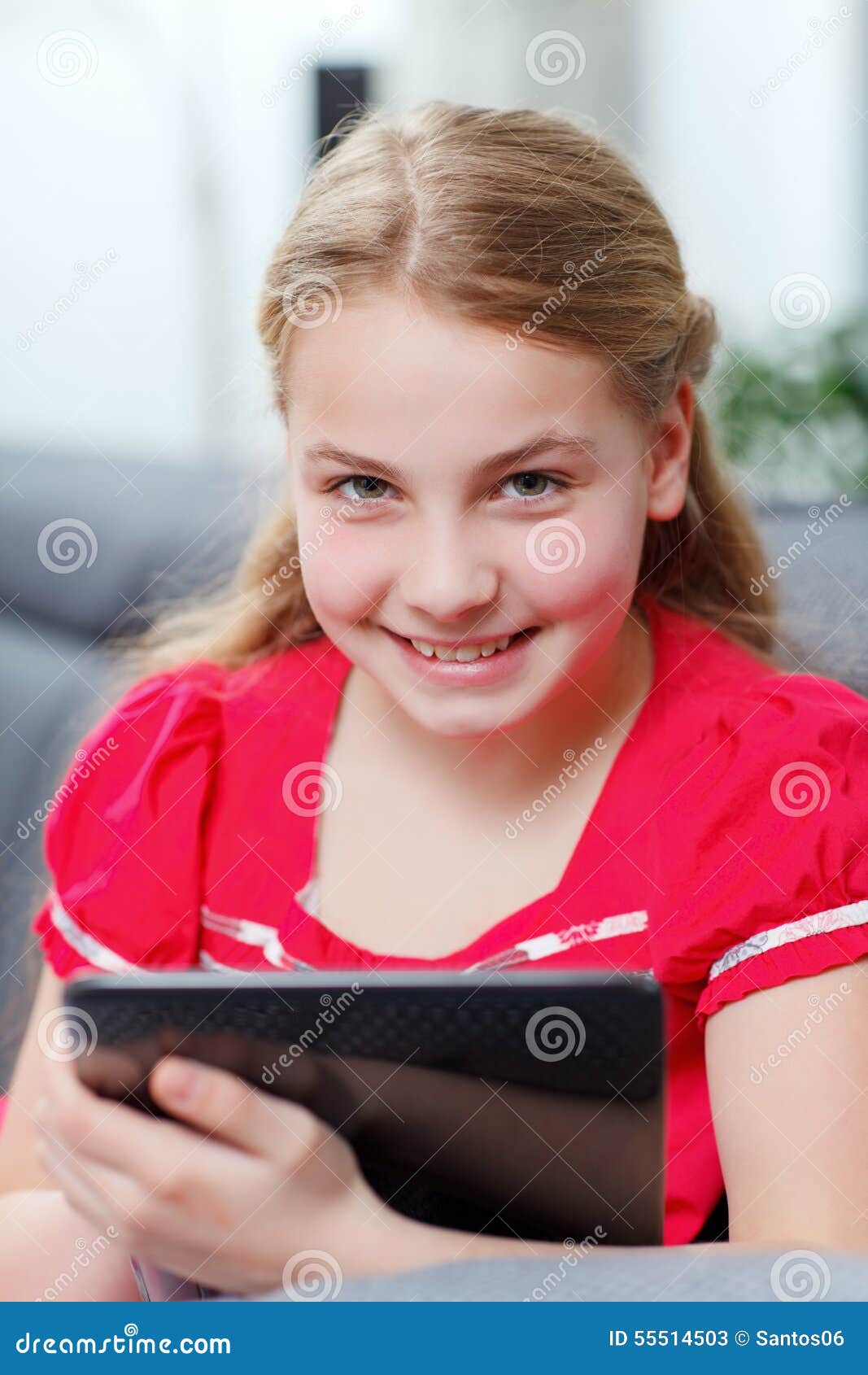 Young girl with tablet stock image. Image of mobile, indoors - 55514503