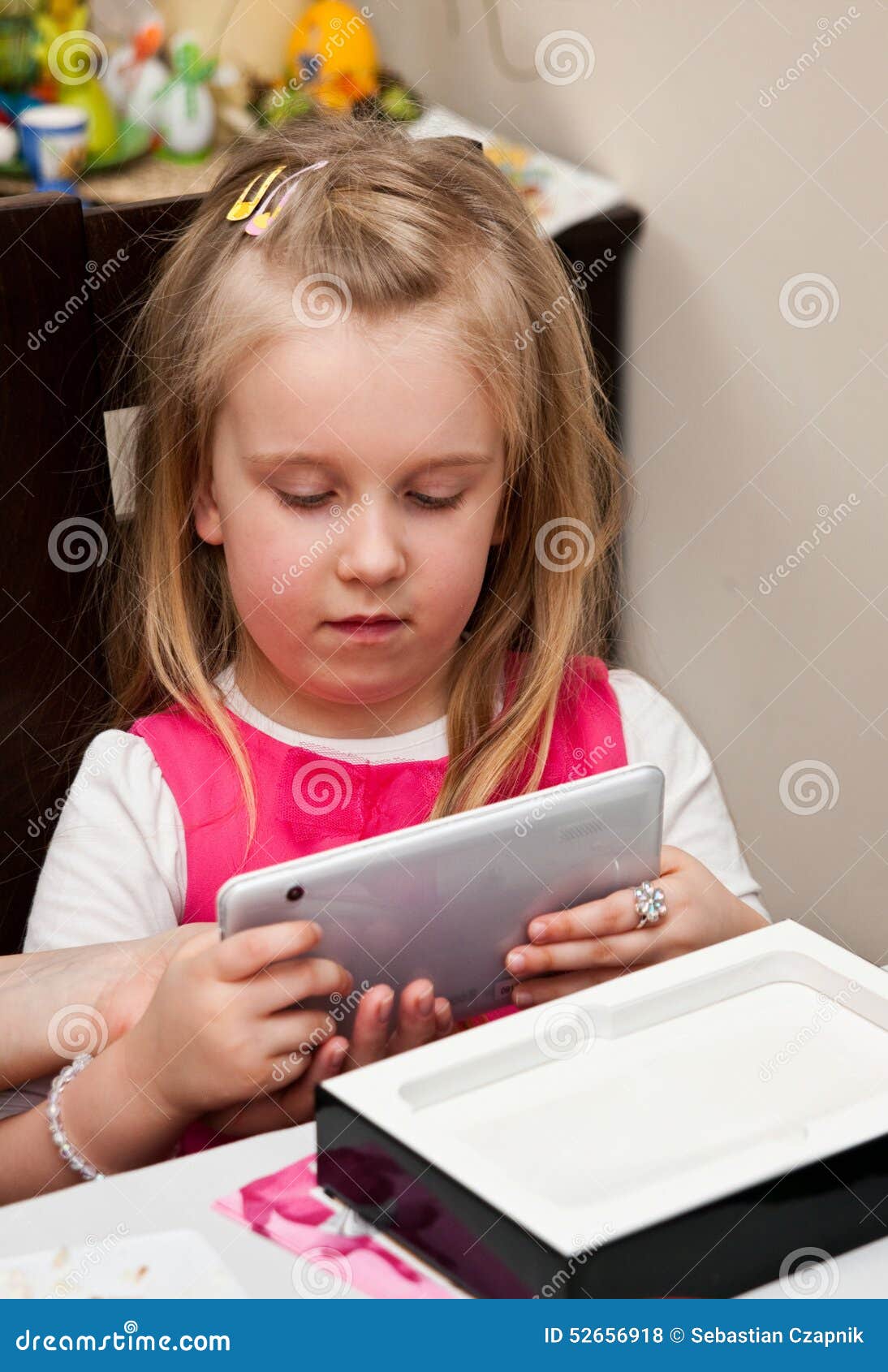 Young girl with tablet stock photo. Image of computing - 52656918