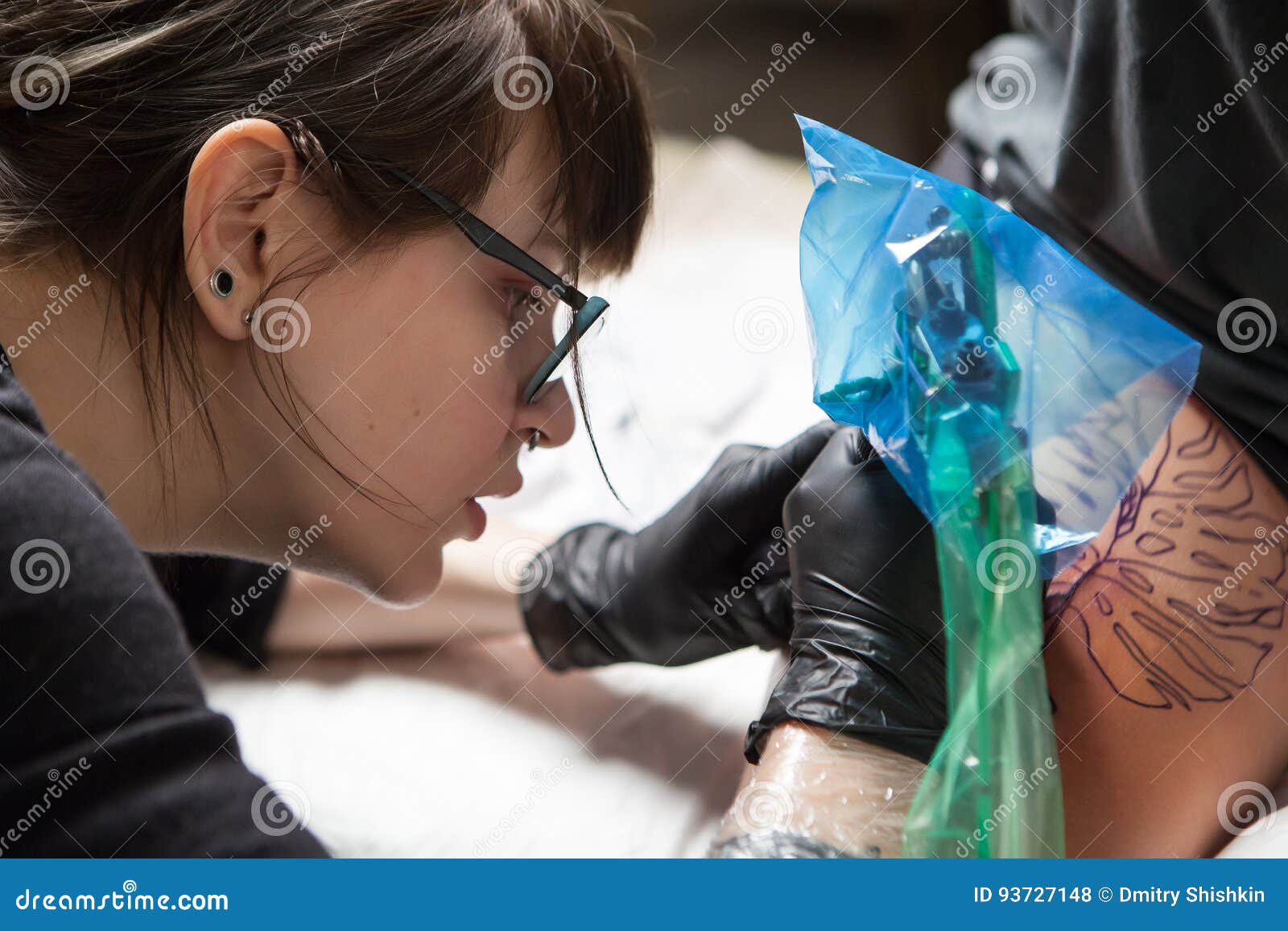 Young Girl Tattoo Master at Work Stock Photo - Image of creative ...