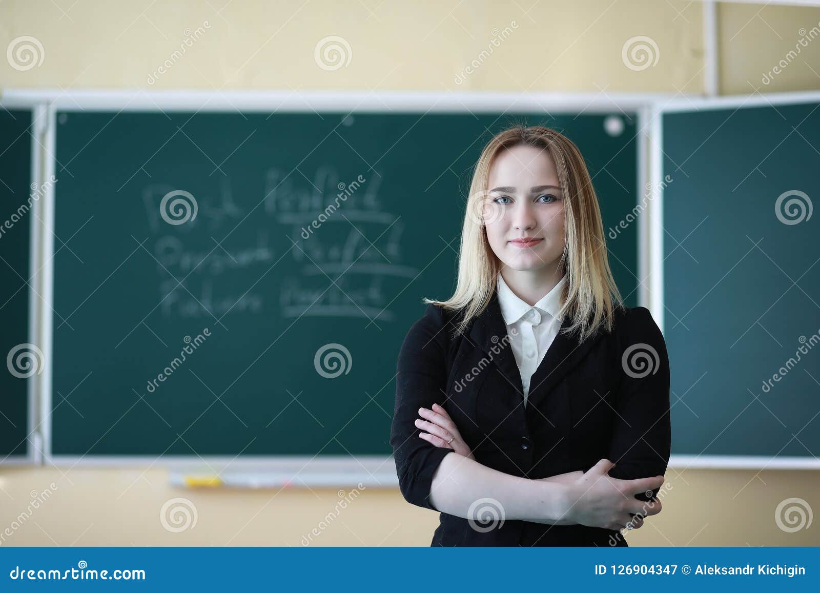 Young Girl Teacher in Primary School Stock Image - Image of educator ...