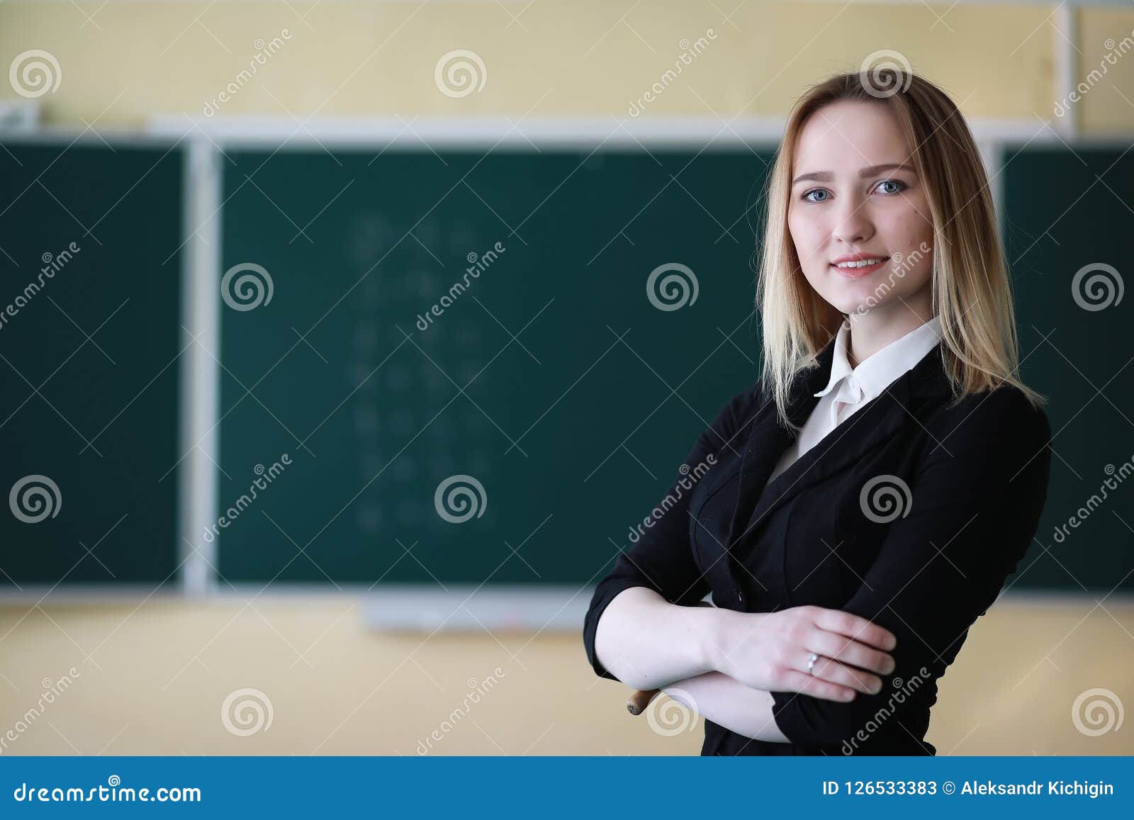 Young Girl Teacher in Primary School Stock Image - Image of kids ...