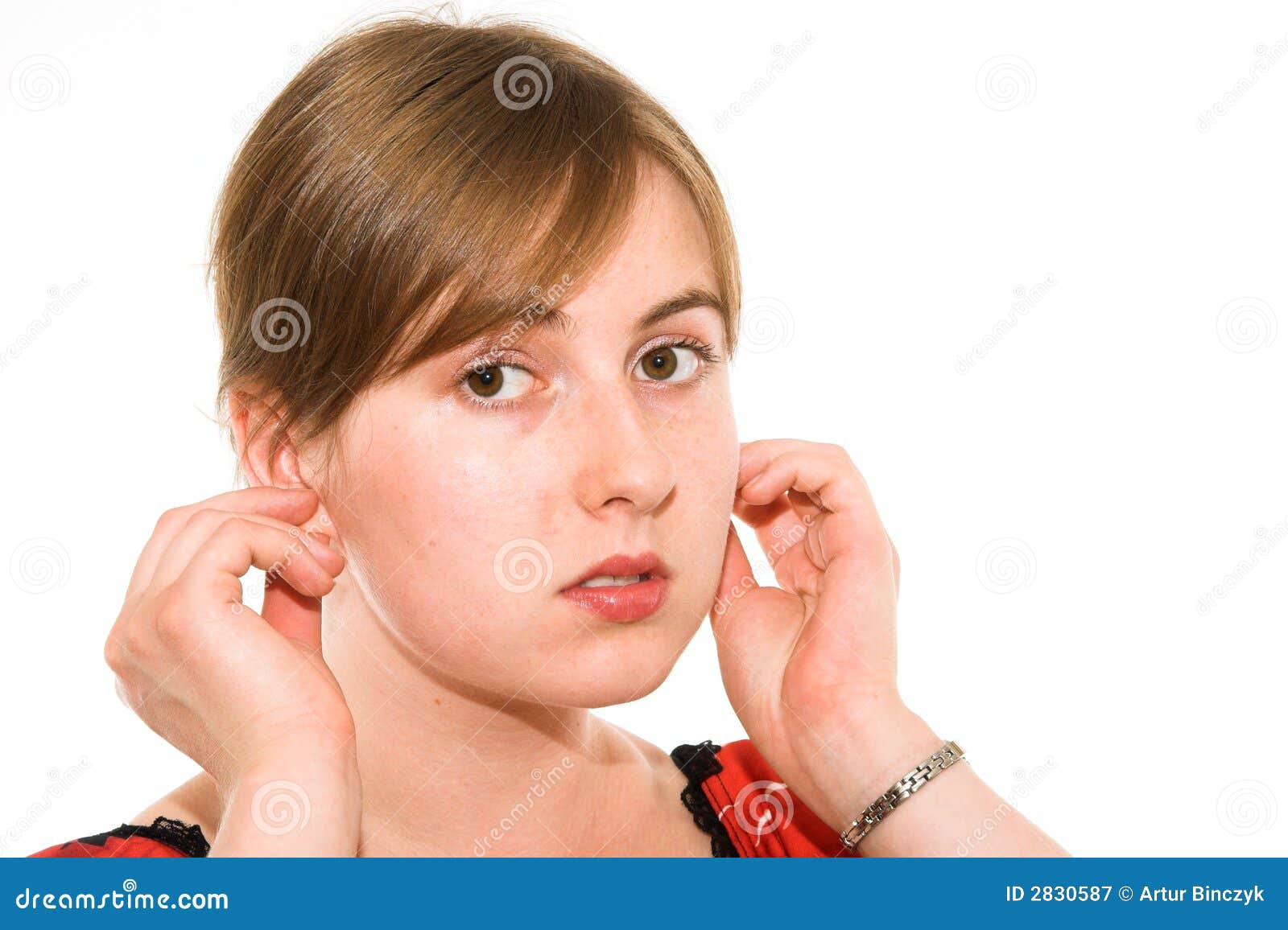 Young girl touchuin ears stock image. Image of shoulders - 2830587