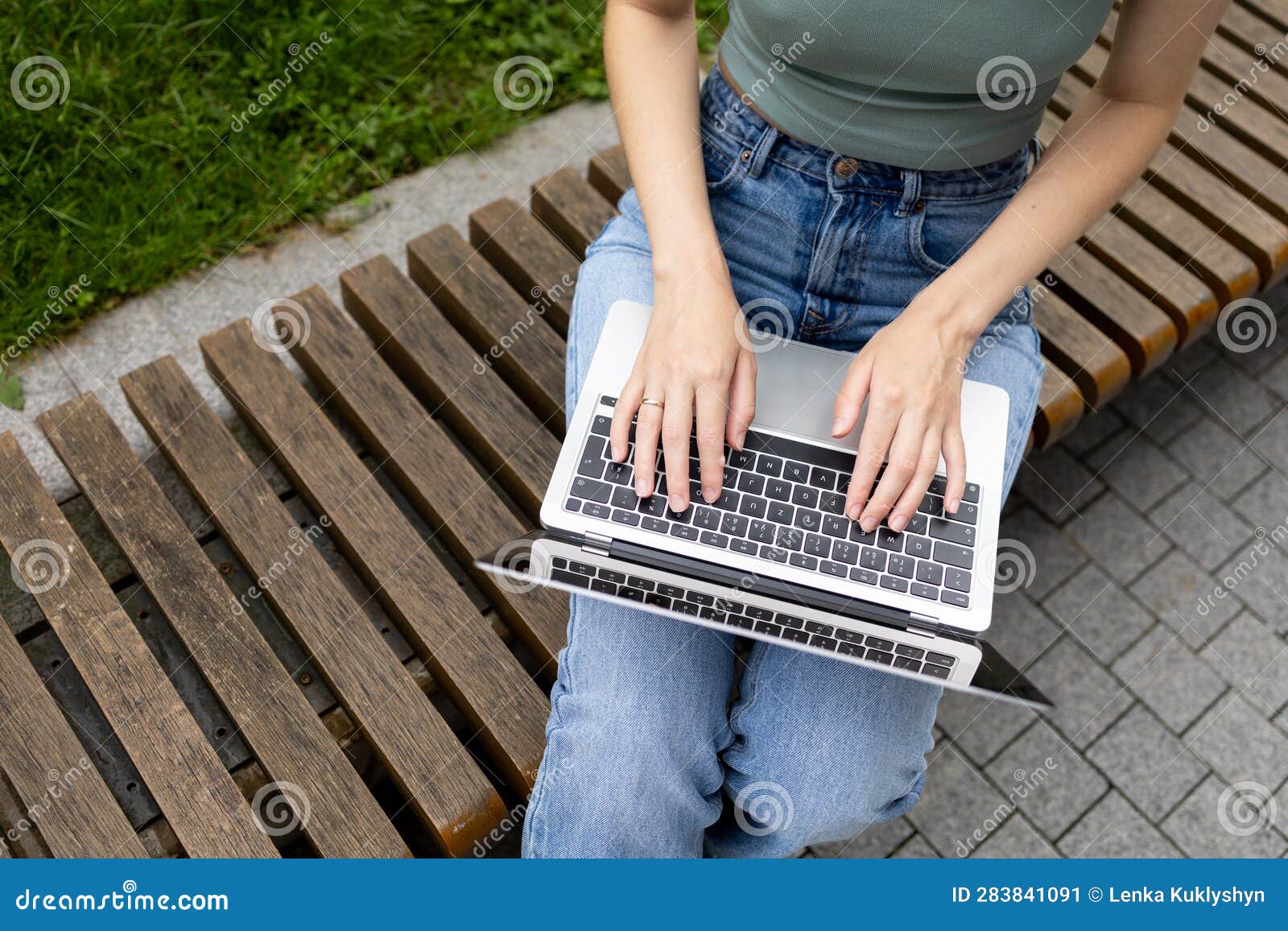 A Young Girl Types on the Keyboard of a Laptop, Computer. Stock Image ...