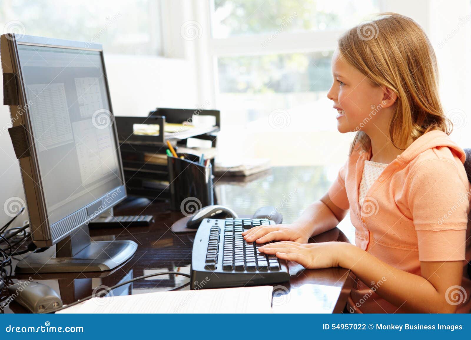 Young Girl Using Computer at Home Stock Photo - Image of child ...