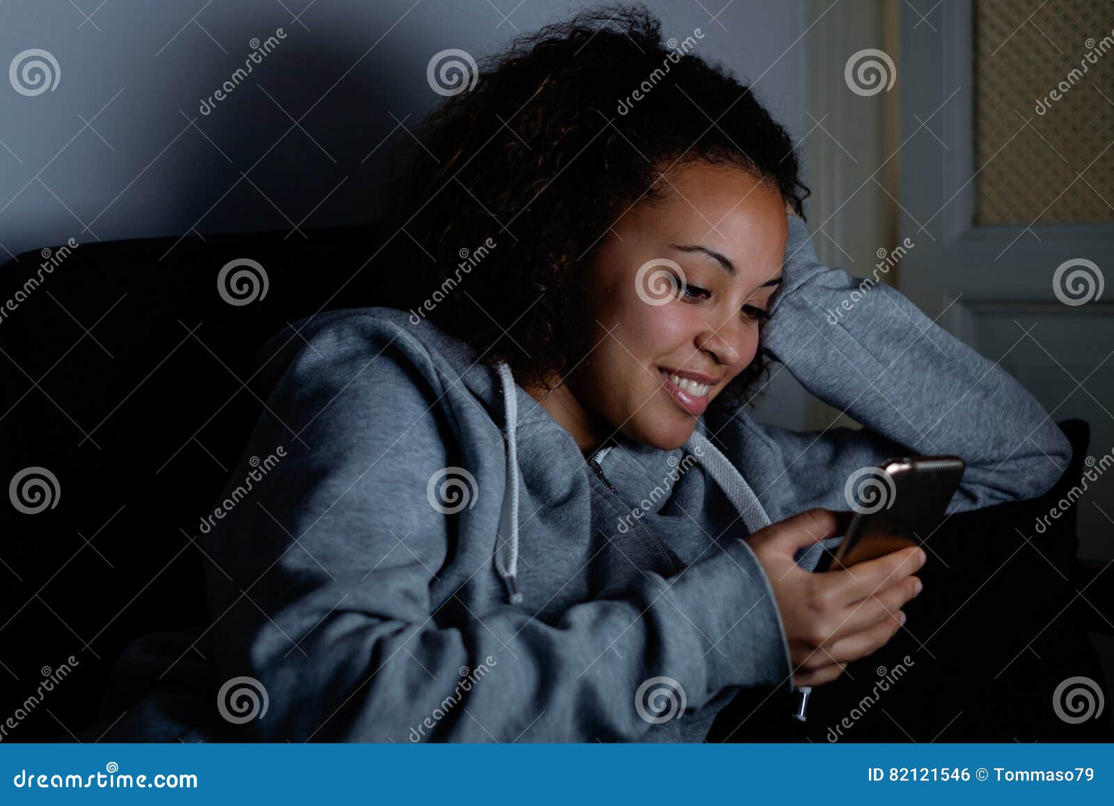 Young Girl Using Her Mobile at Night Stock Photo - Image of hand ...
