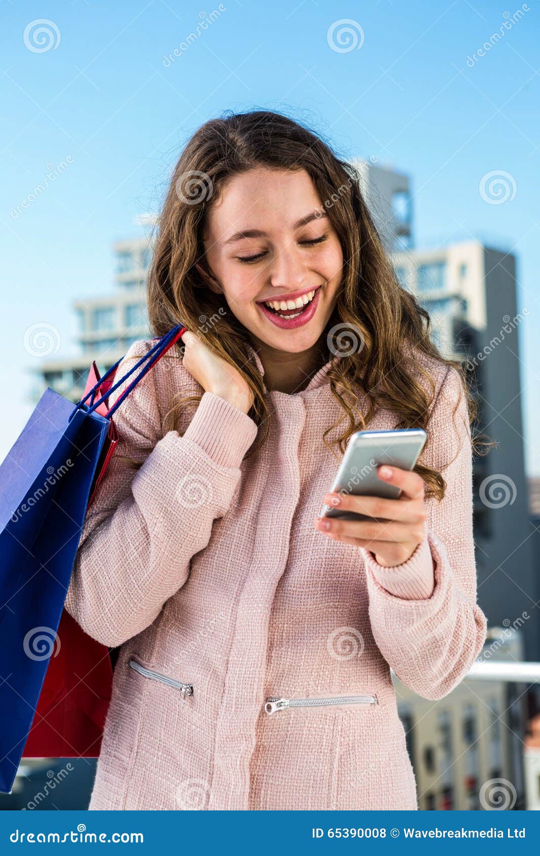 Young girl using her phone stock photo. Image of glamour - 65390008