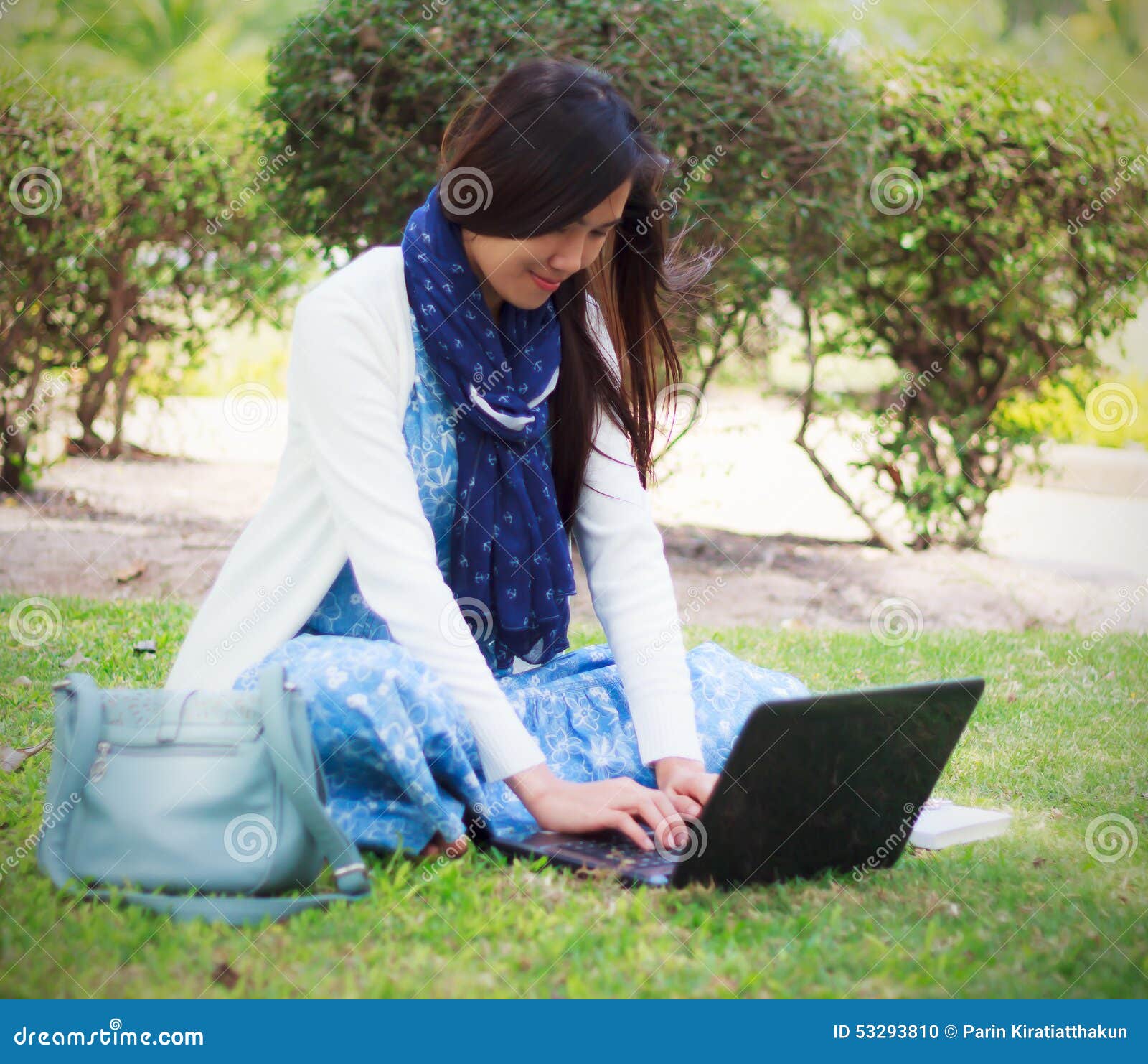 Young girl using laptop stock photo. Image of pretty - 53293810
