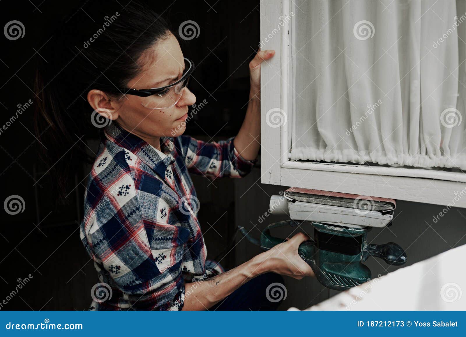 A Young Girl Using a Sander Stock Image - Image of wood, profession ...