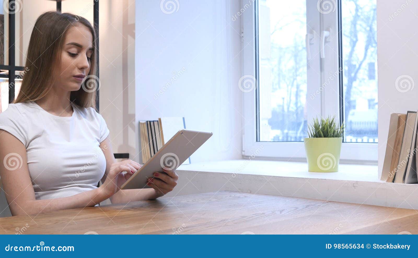 Young Girl Using Tablet at Work Stock Photo - Image of businessman ...