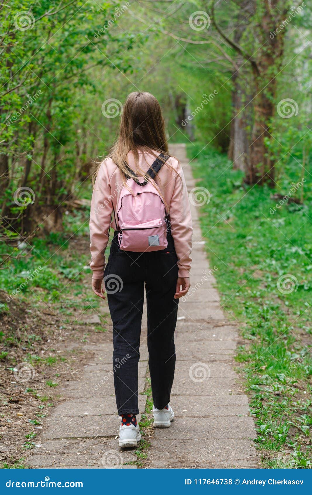 Young Girl Walking Along a Path in the Forest Stock Photo - Image of ...
