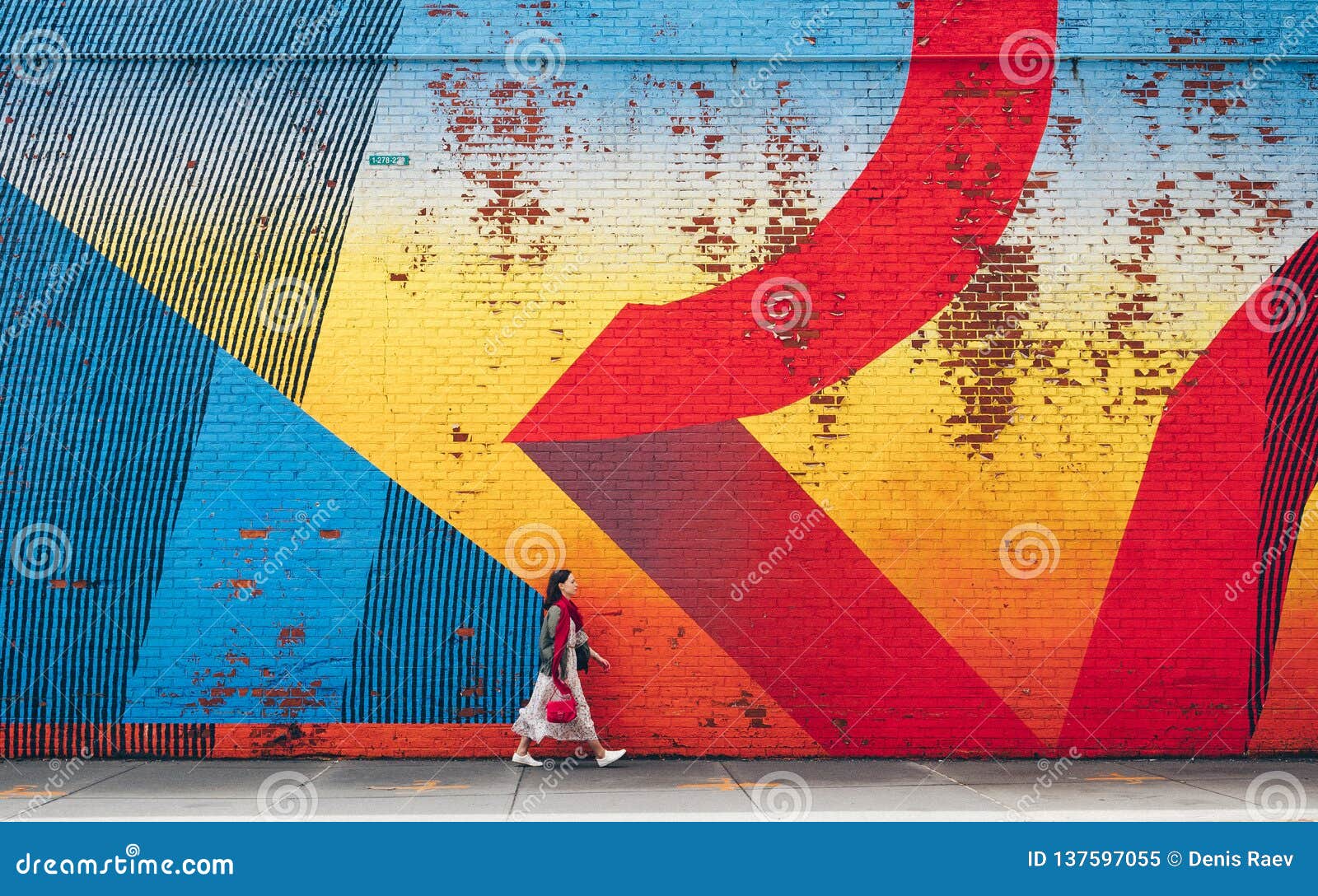 Young Girl Walking by the Wall with Graffiti Editorial Image - Image of ...