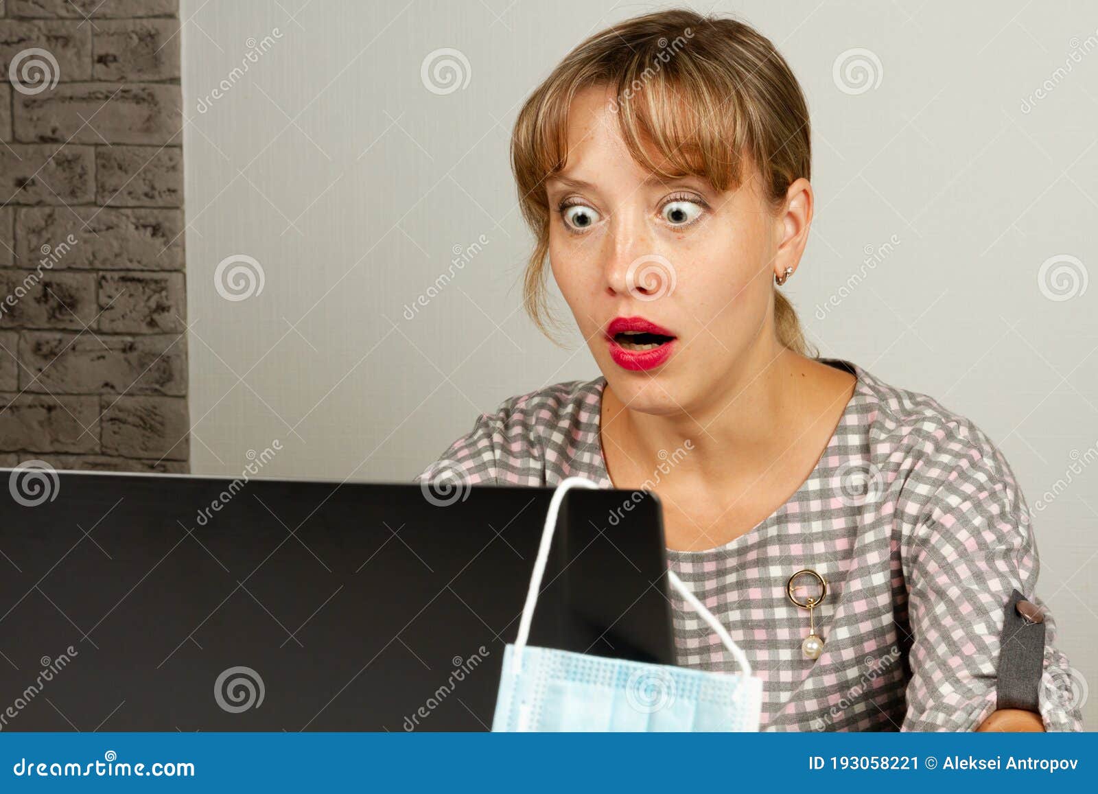 Young Girl Was Very Surprised Working in the Office at the Computer ...