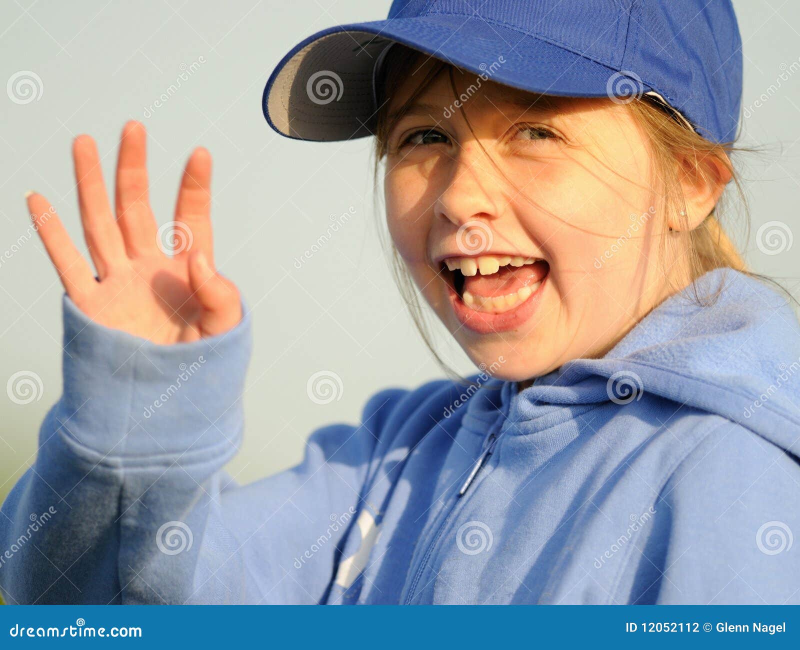 Young girl waving stock photo. Image of expression, jacket - 12052112