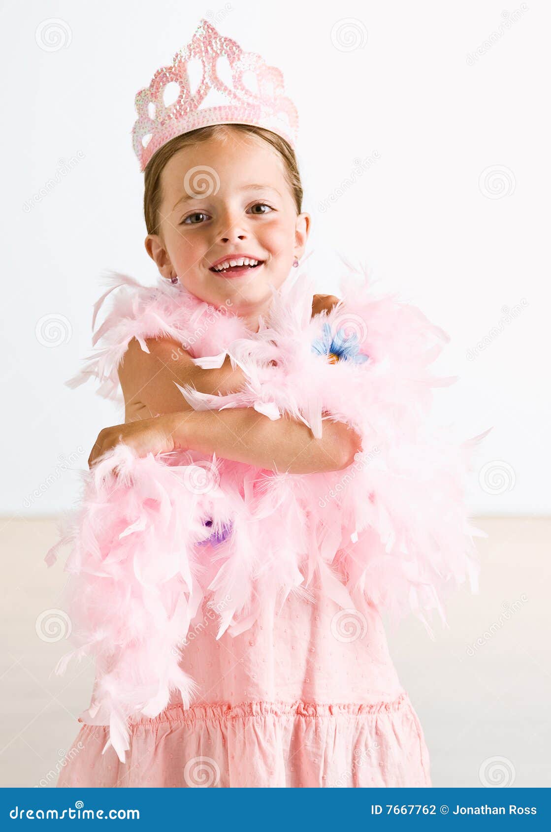 Young Girl Wearing Crown and Feather Boa Stock Photo - Image of person ...