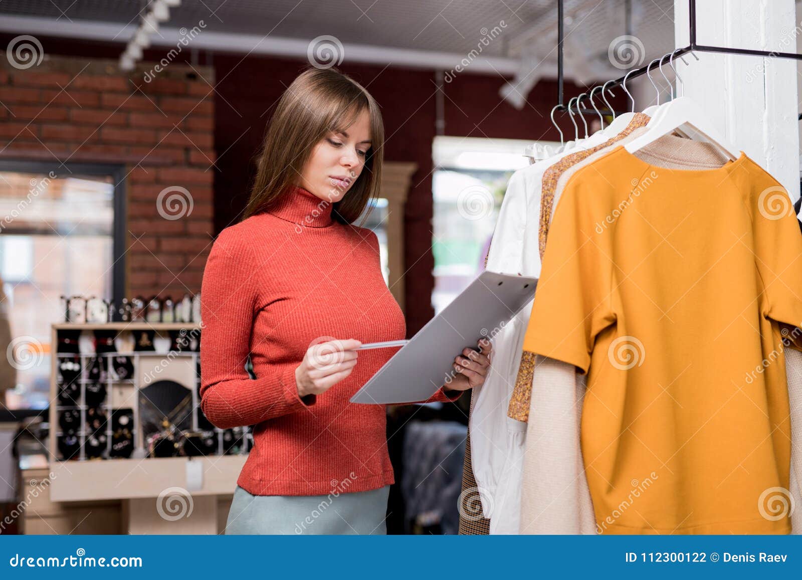 Young girl at work stock photo. Image of fashion, boutique - 112300122
