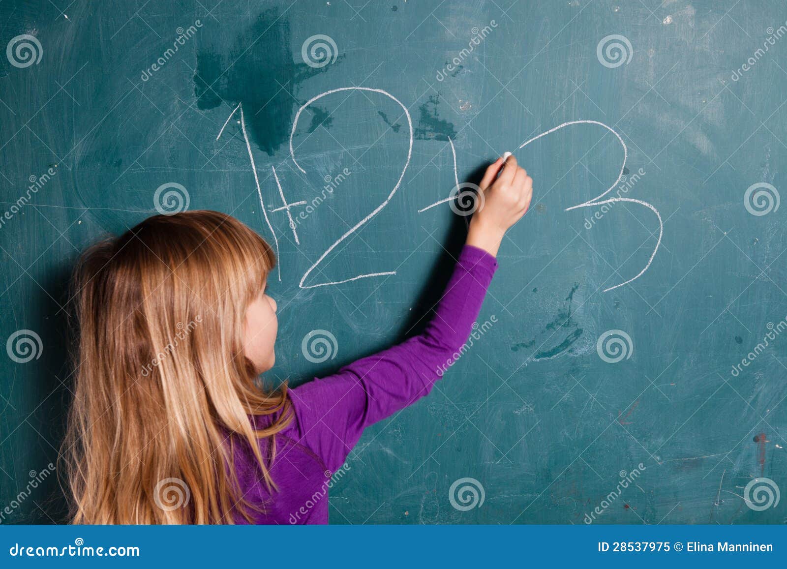 Young Girl Writing Numbers on Chalkboard Stock Image - Image of ...