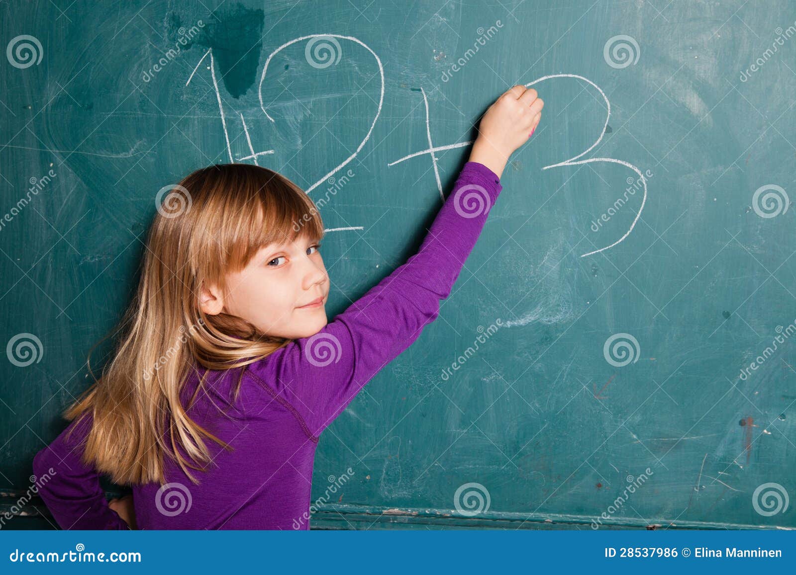 Young Girl Writing Numbers on Chalkboard Stock Photo - Image of ...