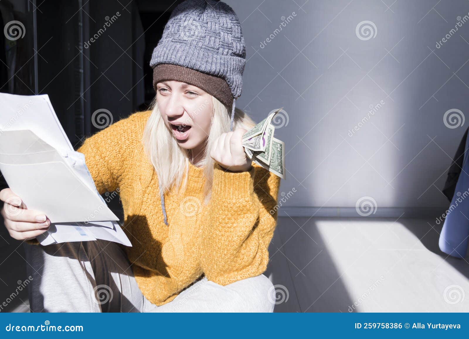 A Young Girl in a Yellow Sweater and Two Hats is Horrified To Study ... A Young Girl in a Yellow Sweater and Two Hats is Horrified To Study ...