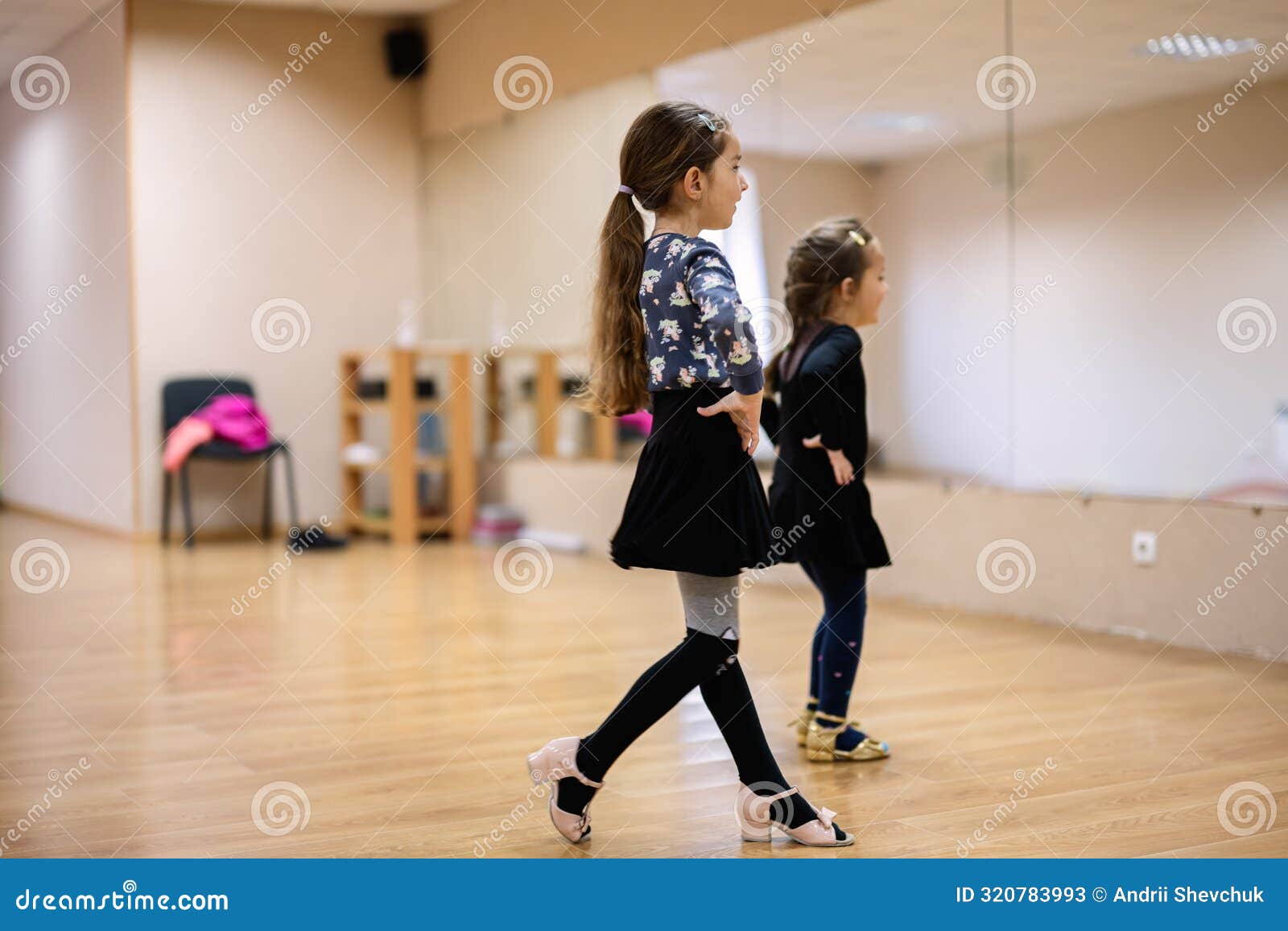 Young Girls Practicing Ballet in Dance Studio with Mirror Reflection ...