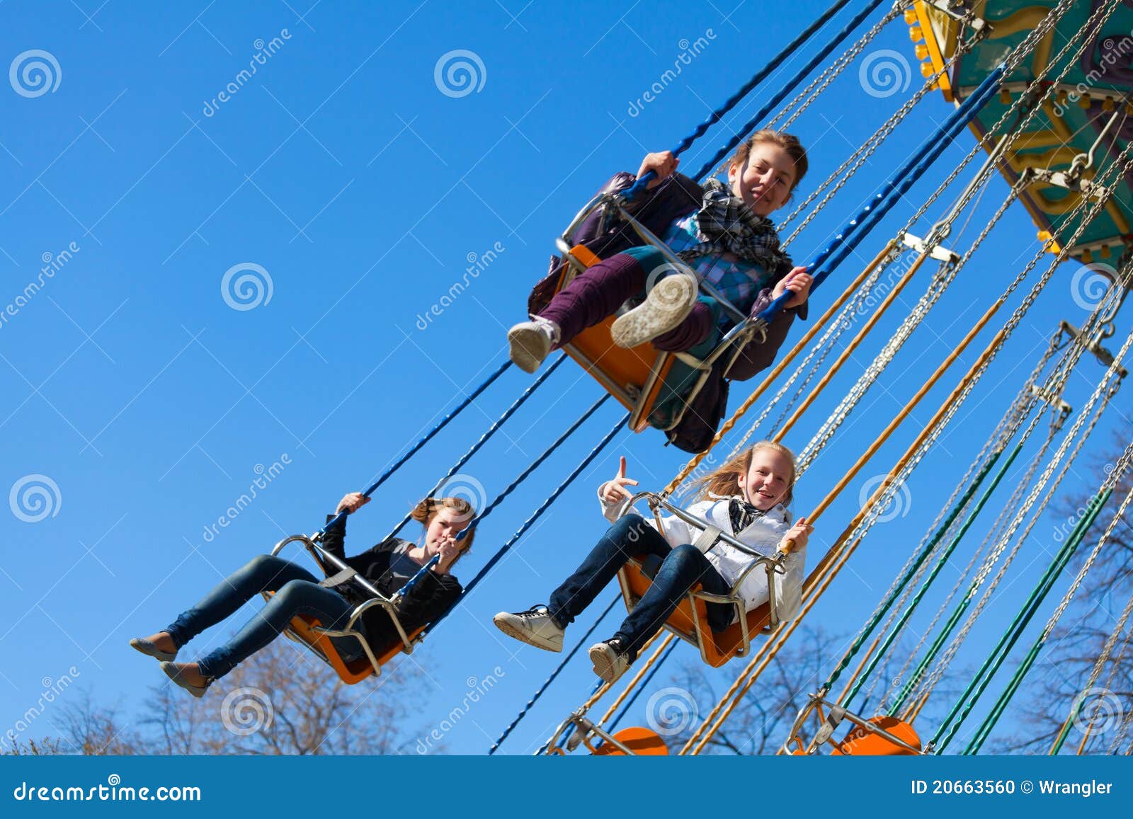 Young Girls on the Swing Carousel Stock Photo - Image of entertainment ...
